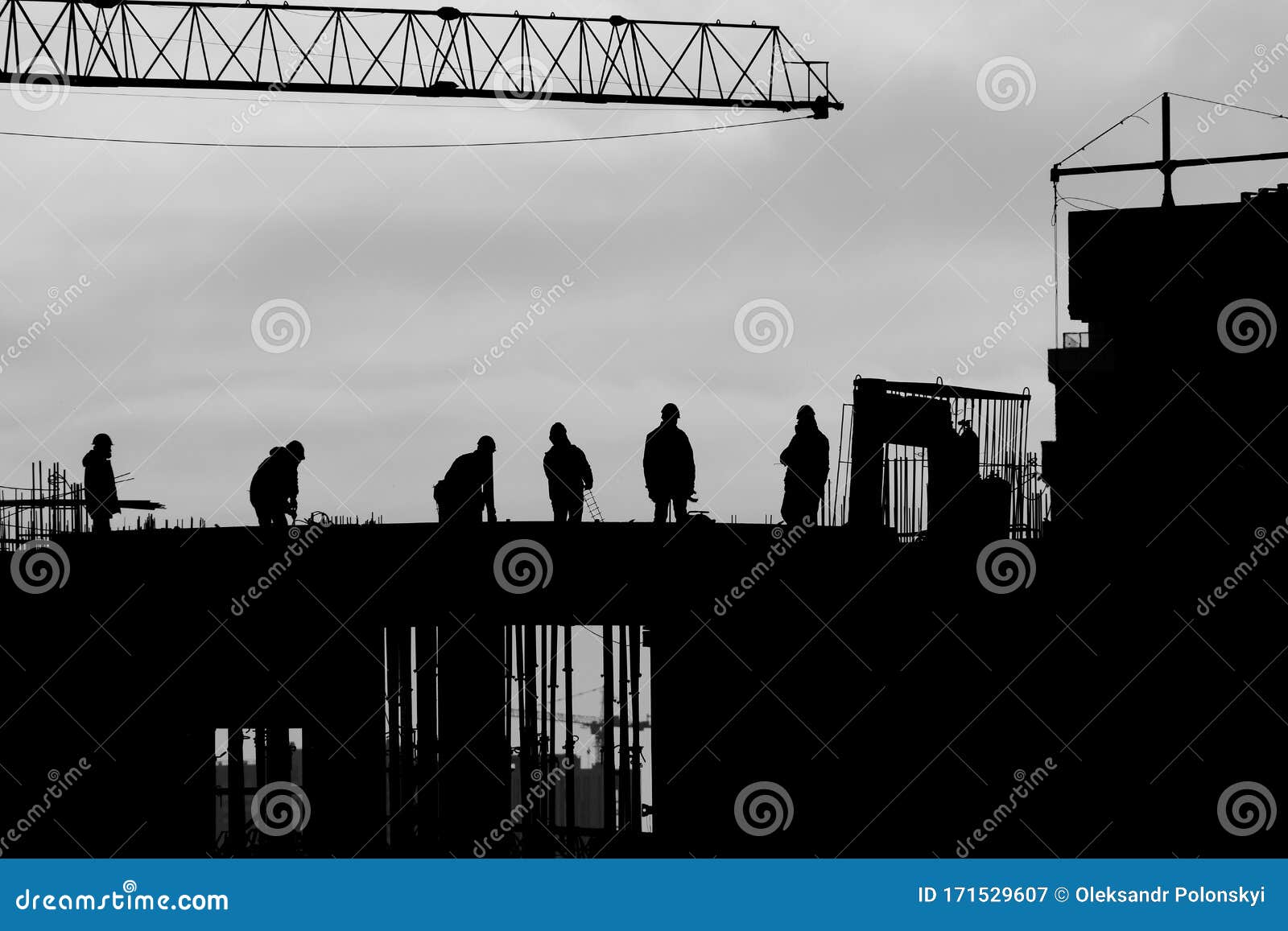 Silhouette of Construction Workers Outdoors at Sunset Stock Image ...