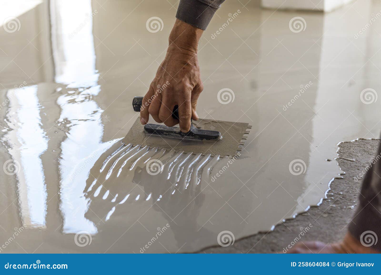 Grey Self-leveling Screed, New Floor Layer, Man Hand Stock Photo ...