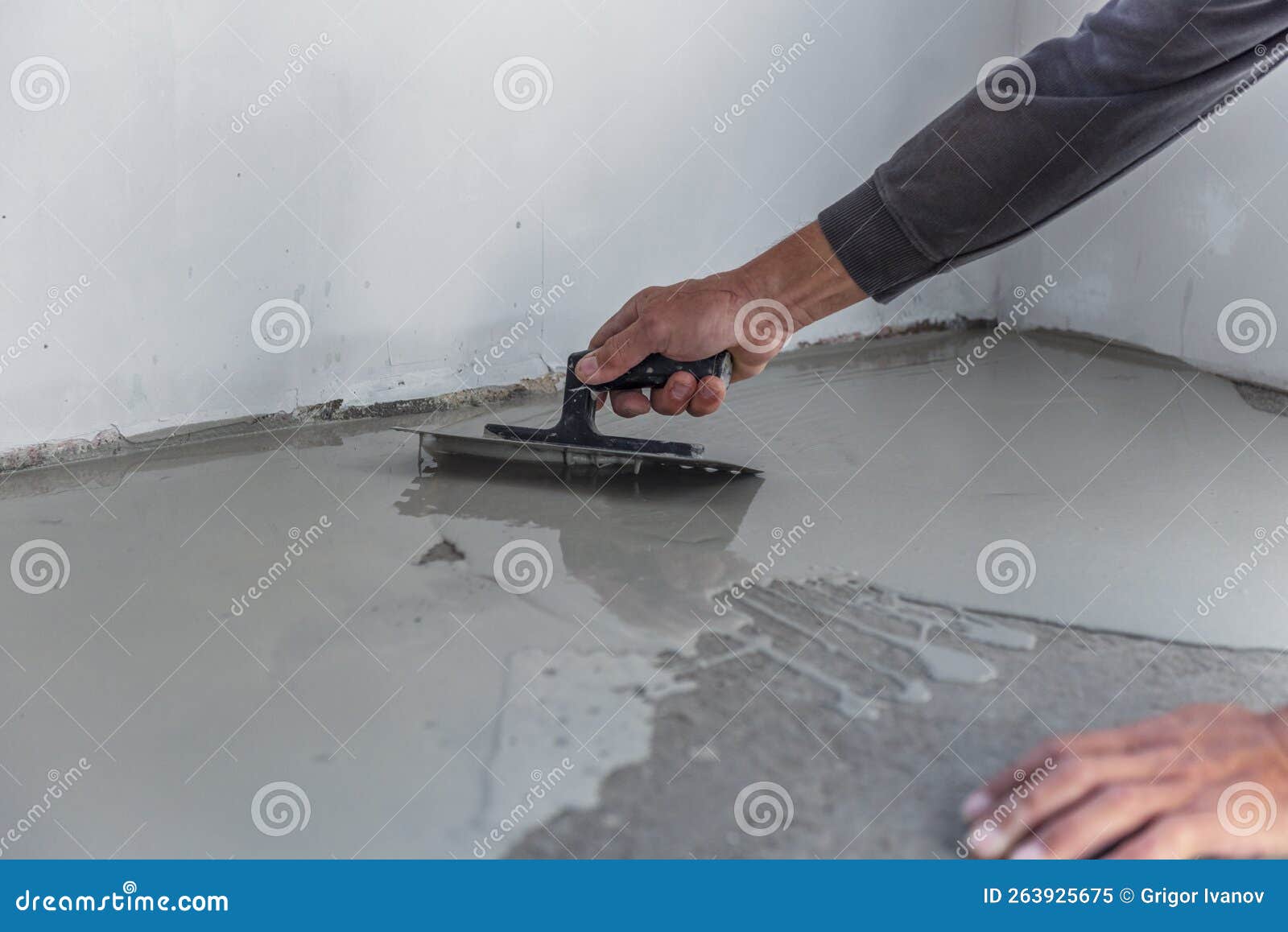 Grey Self-leveling Screed, New Floor Layer, Man Hand Stock Image ...