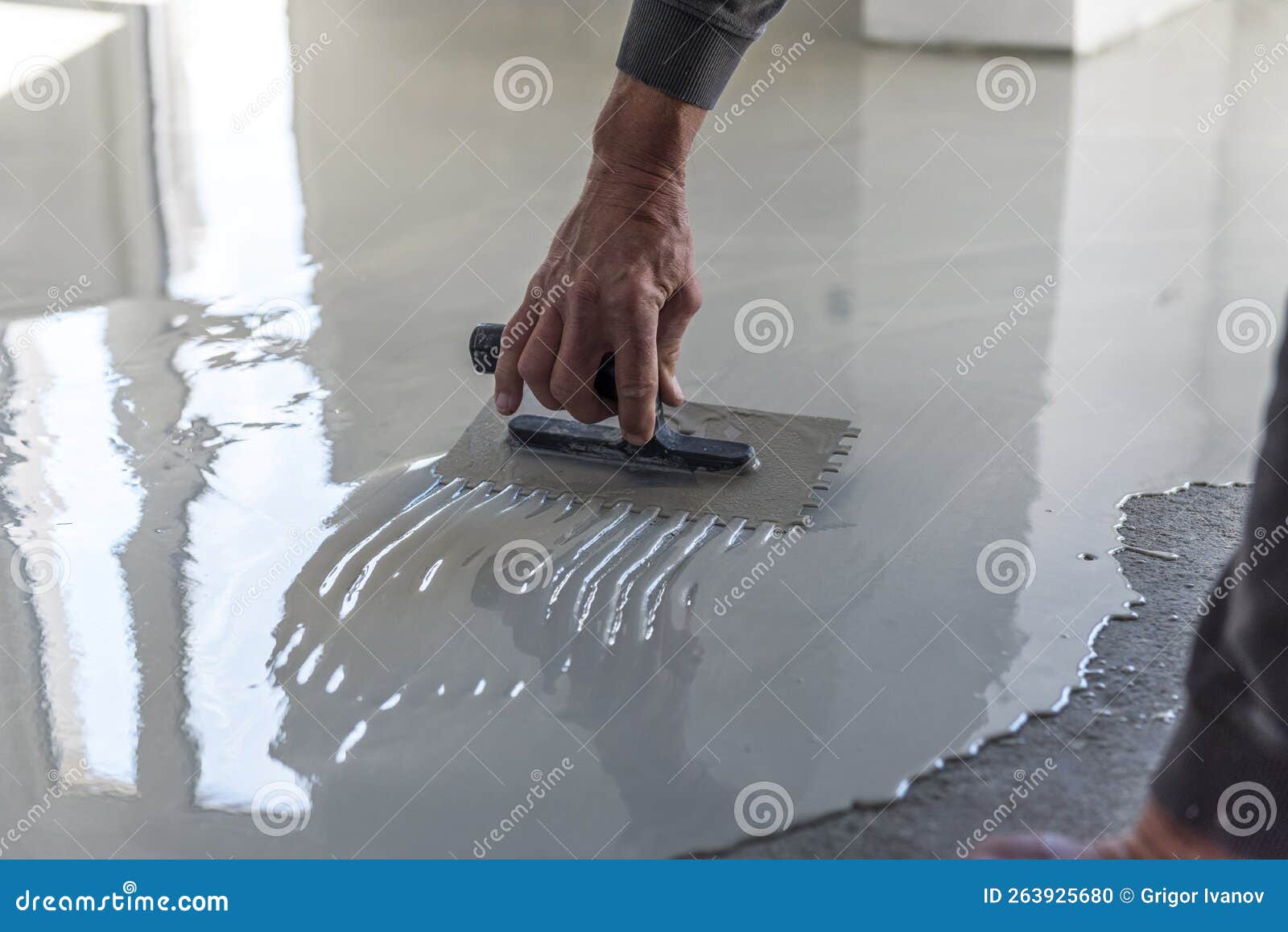 Grey Self-leveling Screed, New Floor Layer, Man Hand Stock Photo ...