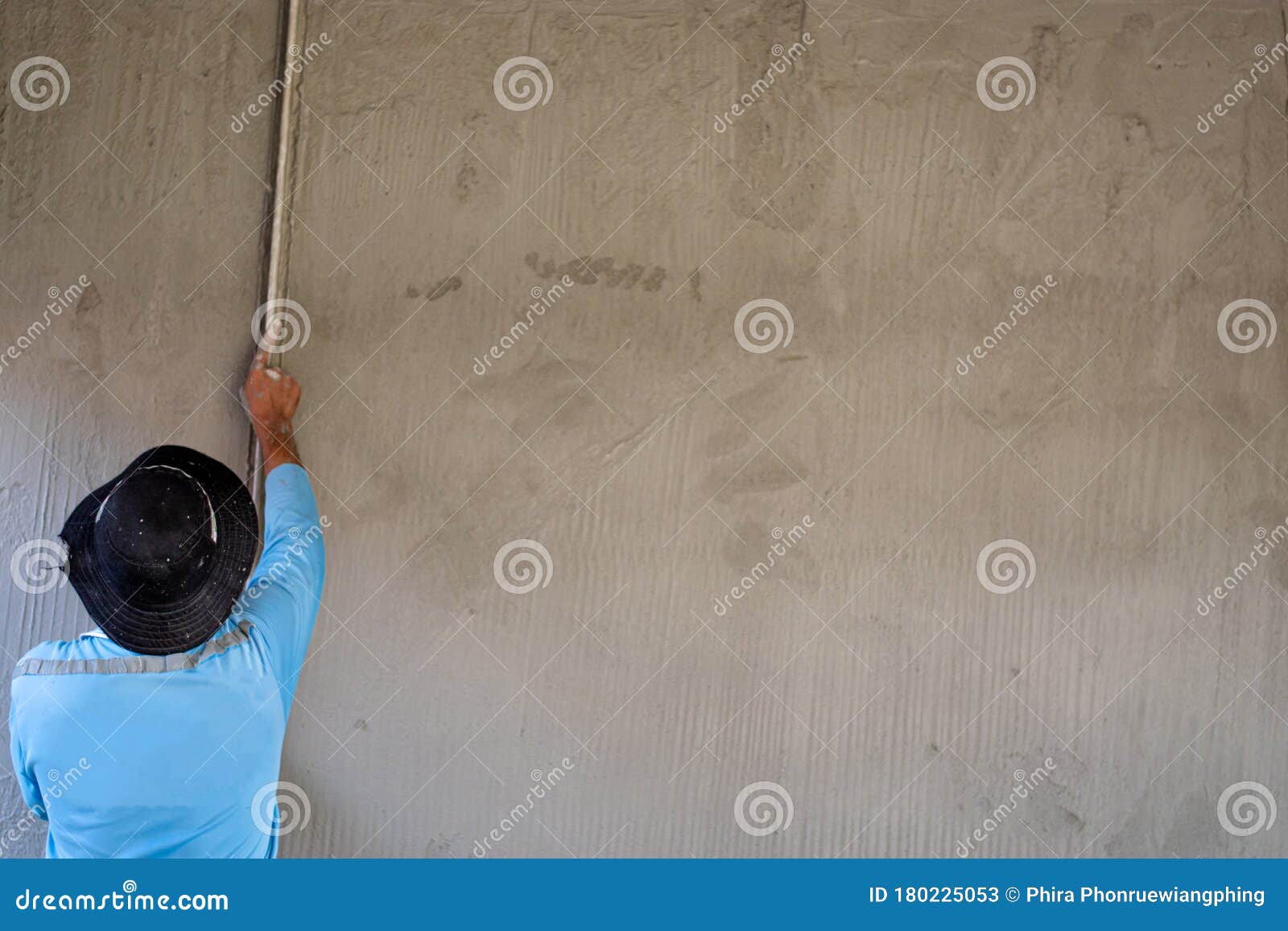 Construction Workers Plastering Cement To Smooth Walls Stock Image ...