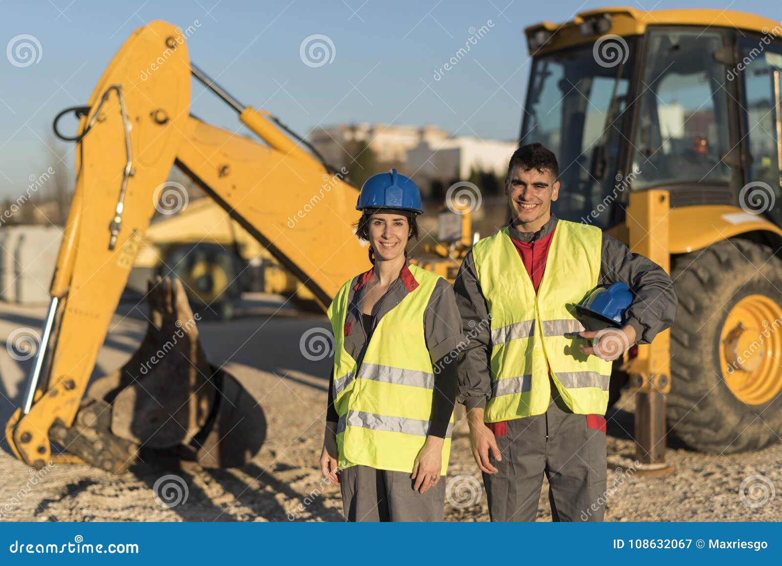 Construction Workers Posing in Portrait Looking at Camera with H Stock ...