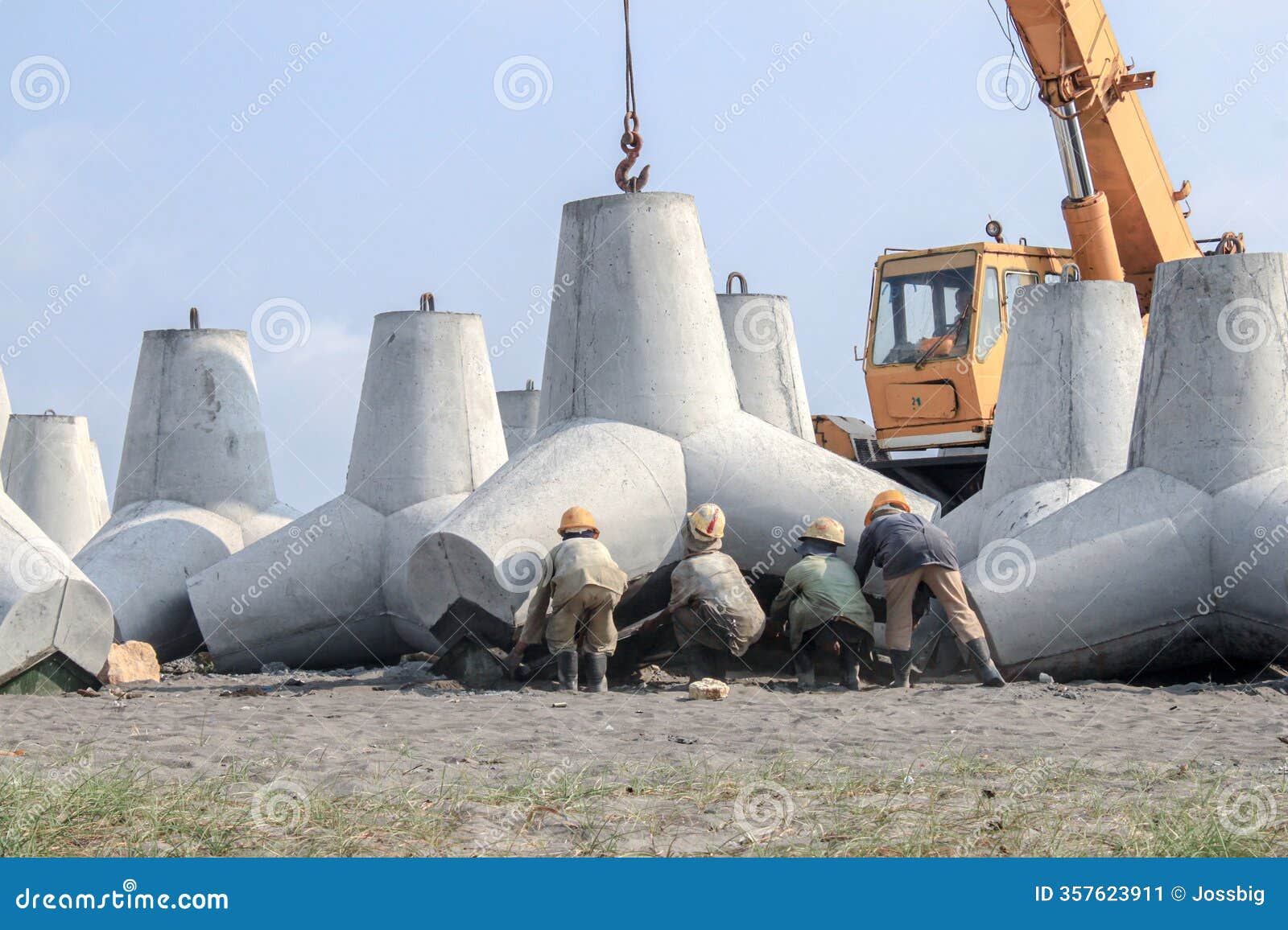Construction Of Wave Breaker Structure With Workers Engaged At Glagah ...