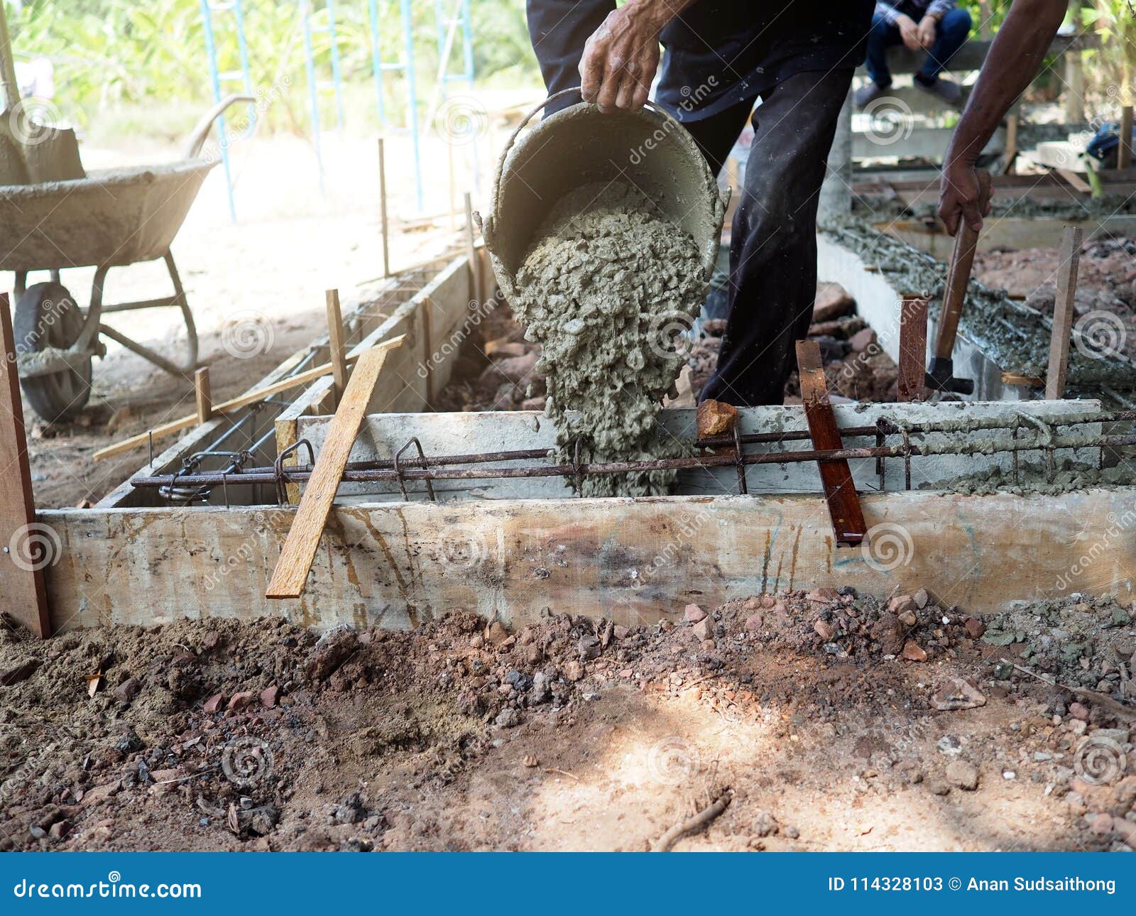 Construction Workers Pouring Concrete in Building Site Stock Image ...