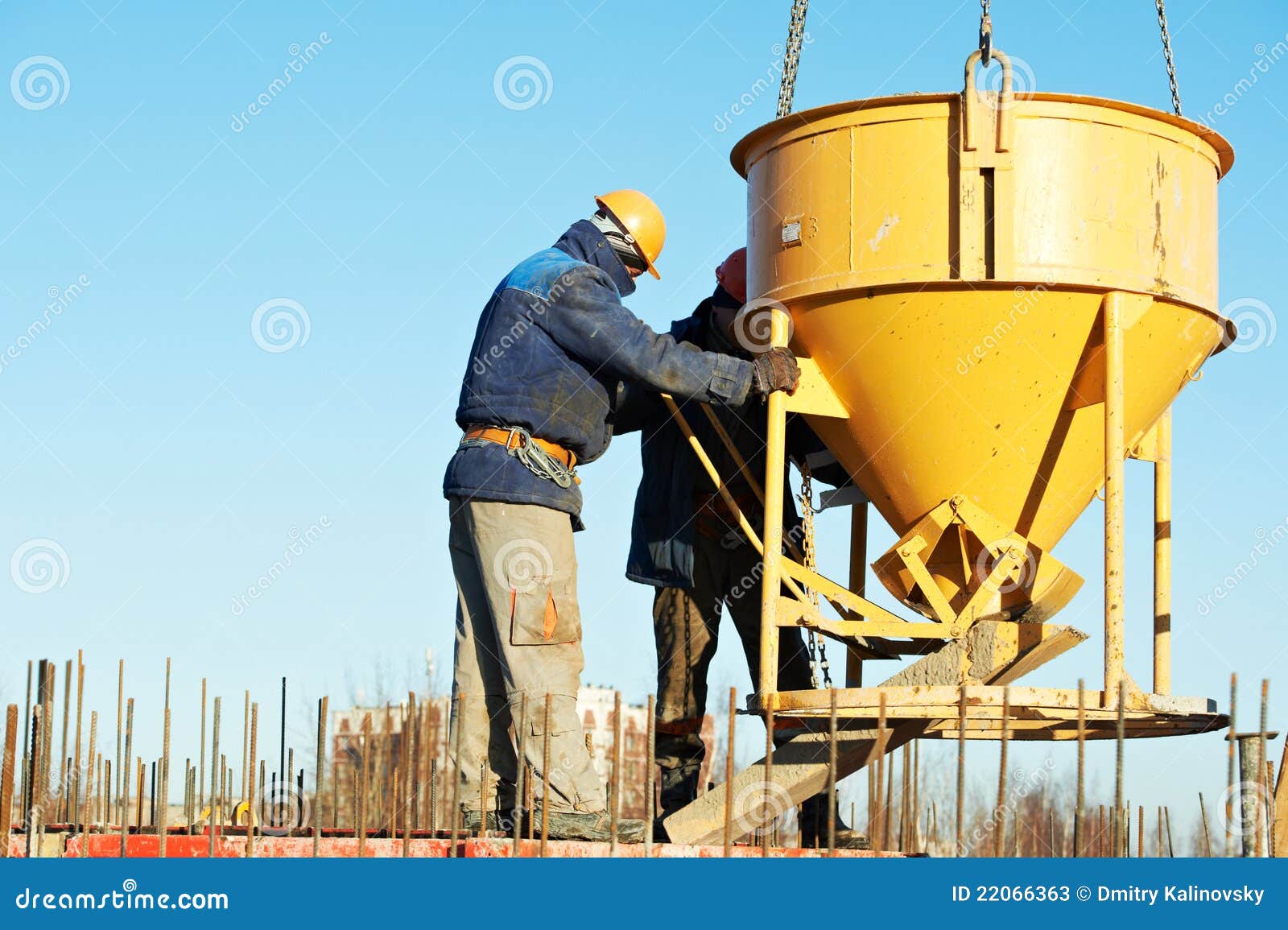 Construction Workers Pouring Concrete in Form Stock Image - Image of ...