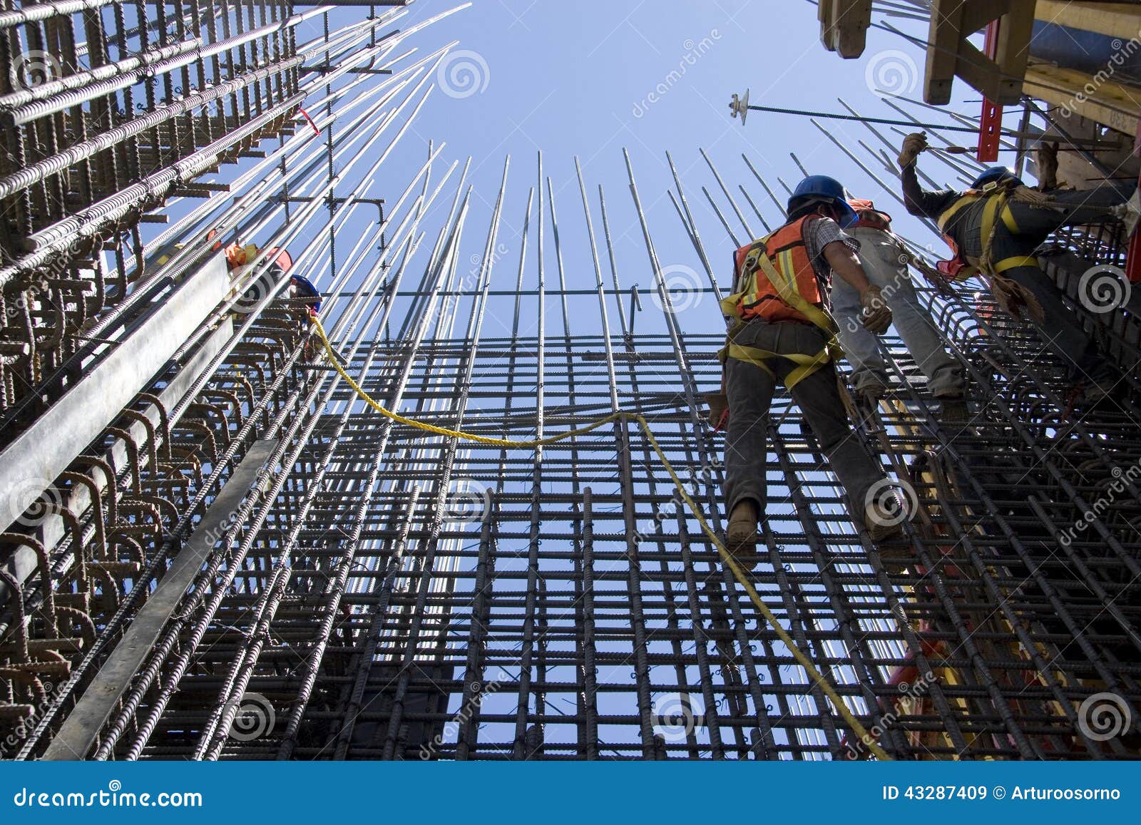 Construction Workers Installing Electrical Cable Tray And Doing Wiring ...