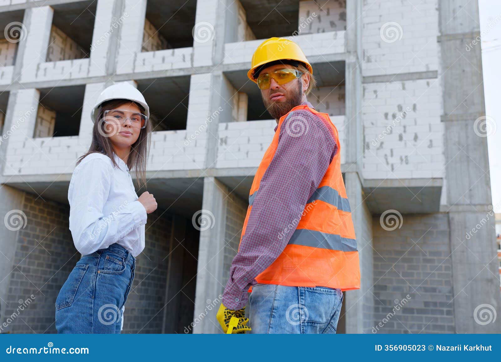 Construction Workers Inspecting Building Site Progress, Teamwork and ...