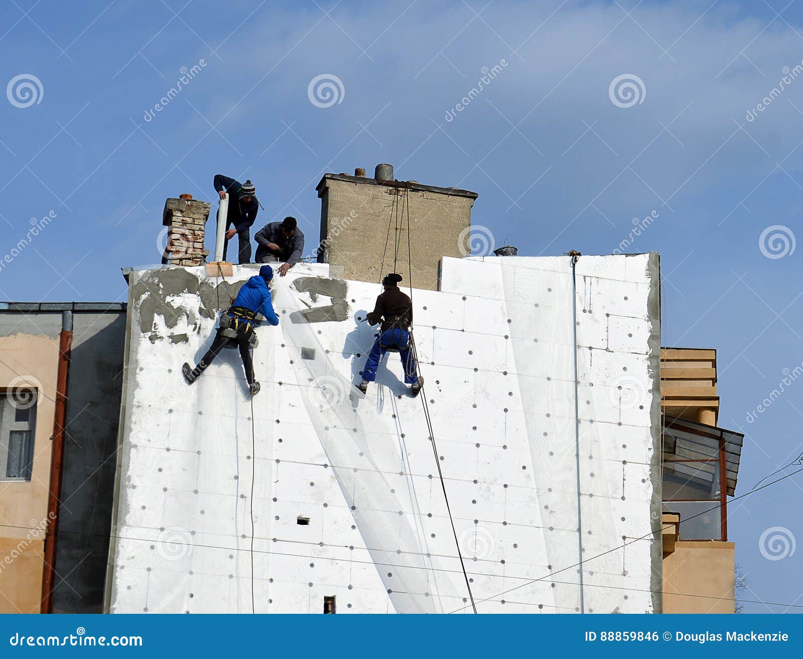 Construction Workers with Ropes on Side of Building Editorial Photo ...