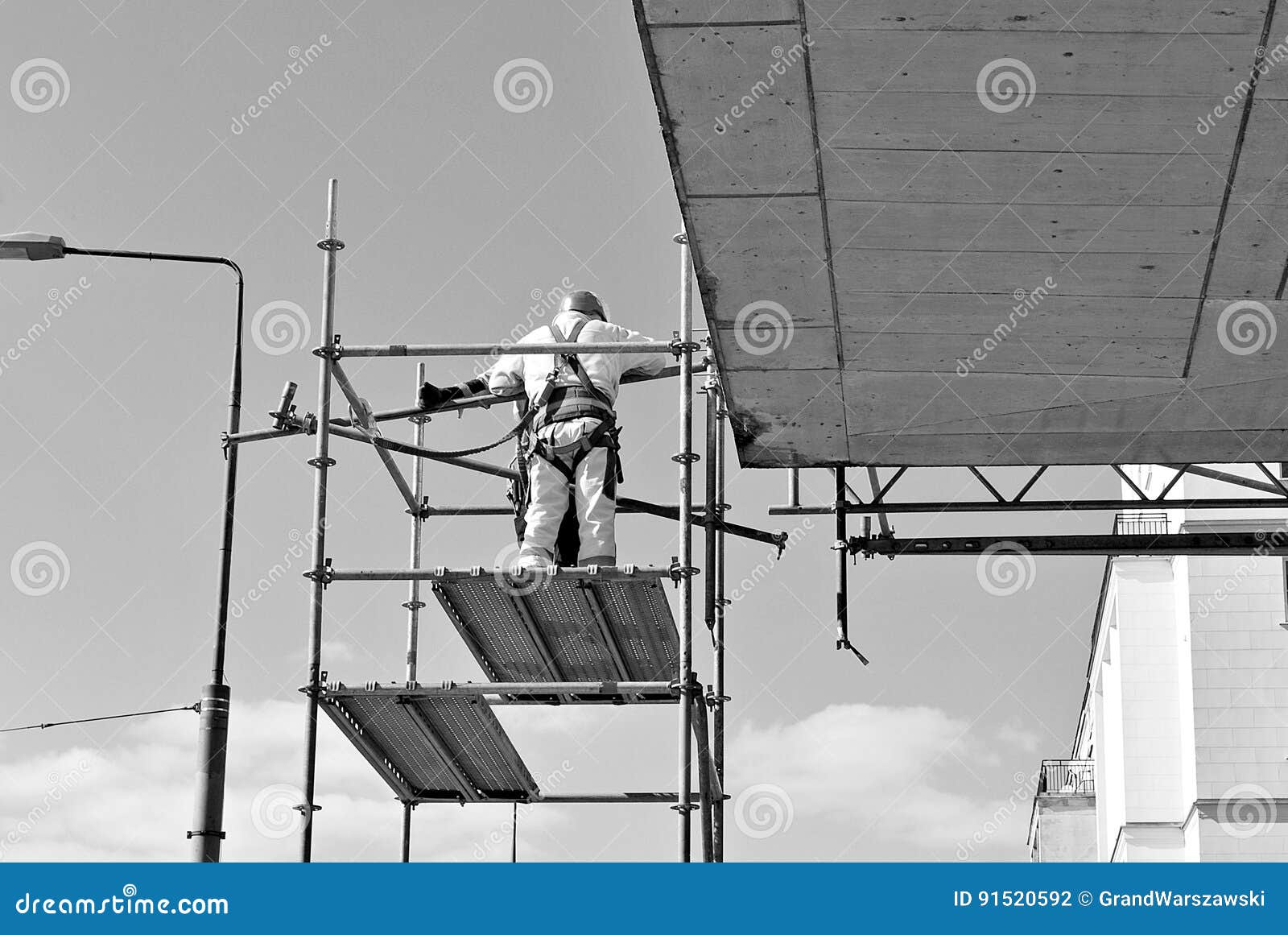 Workers On Scaffold Platform Tied Rebar And Steel Bars Stock Photo ...
