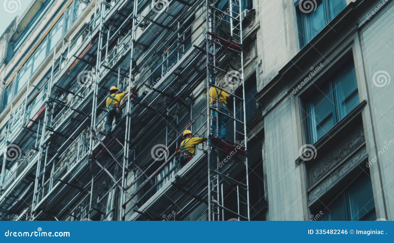Construction Workers on Scaffolding at a High Rise Building Stock ...