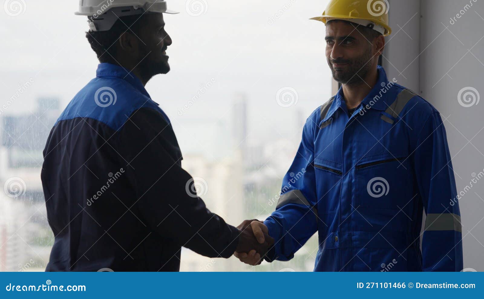 Handshake between Engineer Foreman Manager and Electrician Stock Photo ...