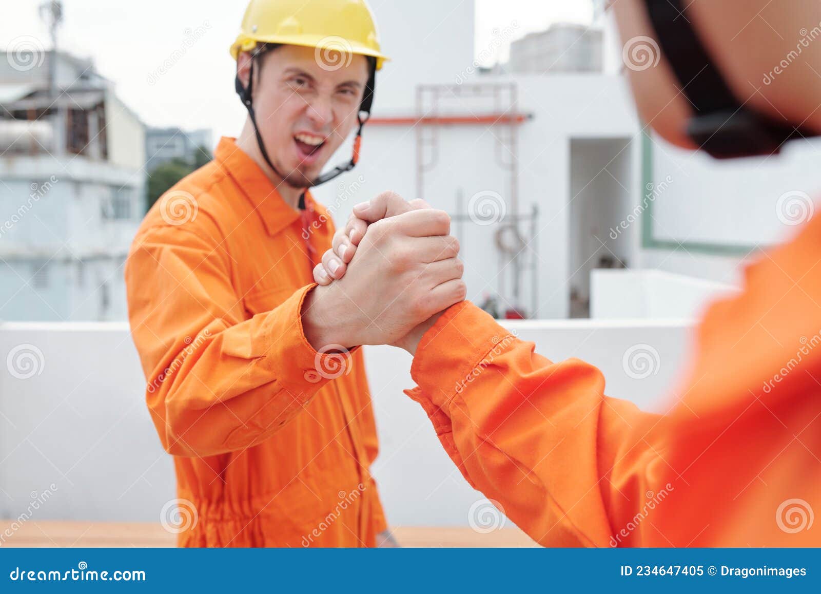 Construction Workers Shaking Hands Stock Image - Image of outdoors ...