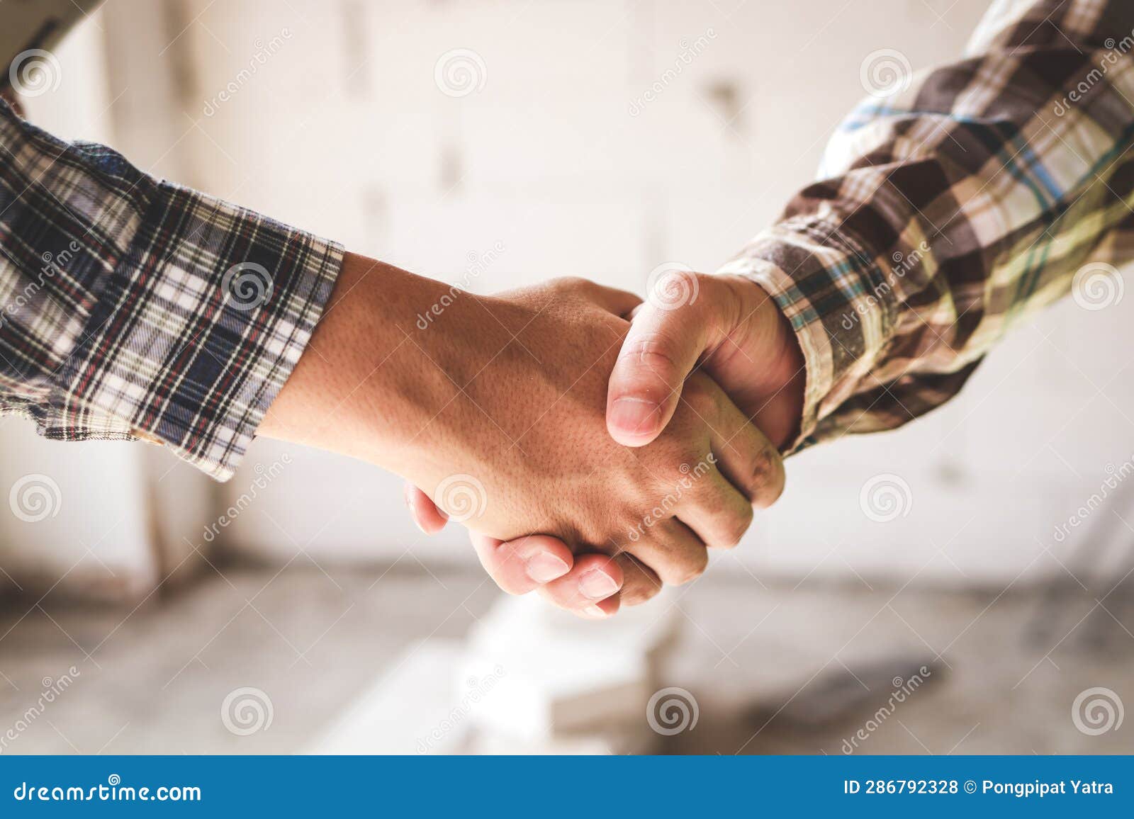 Construction Workers Shaking Hands with Project Engineers Stock Photo ...