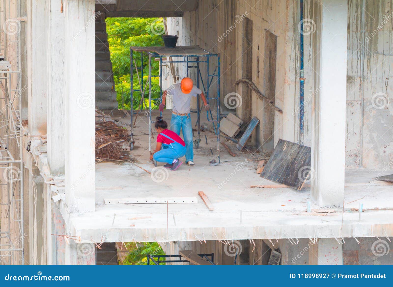 Construction Workers Site and Building of Housing at Laborer Work ...