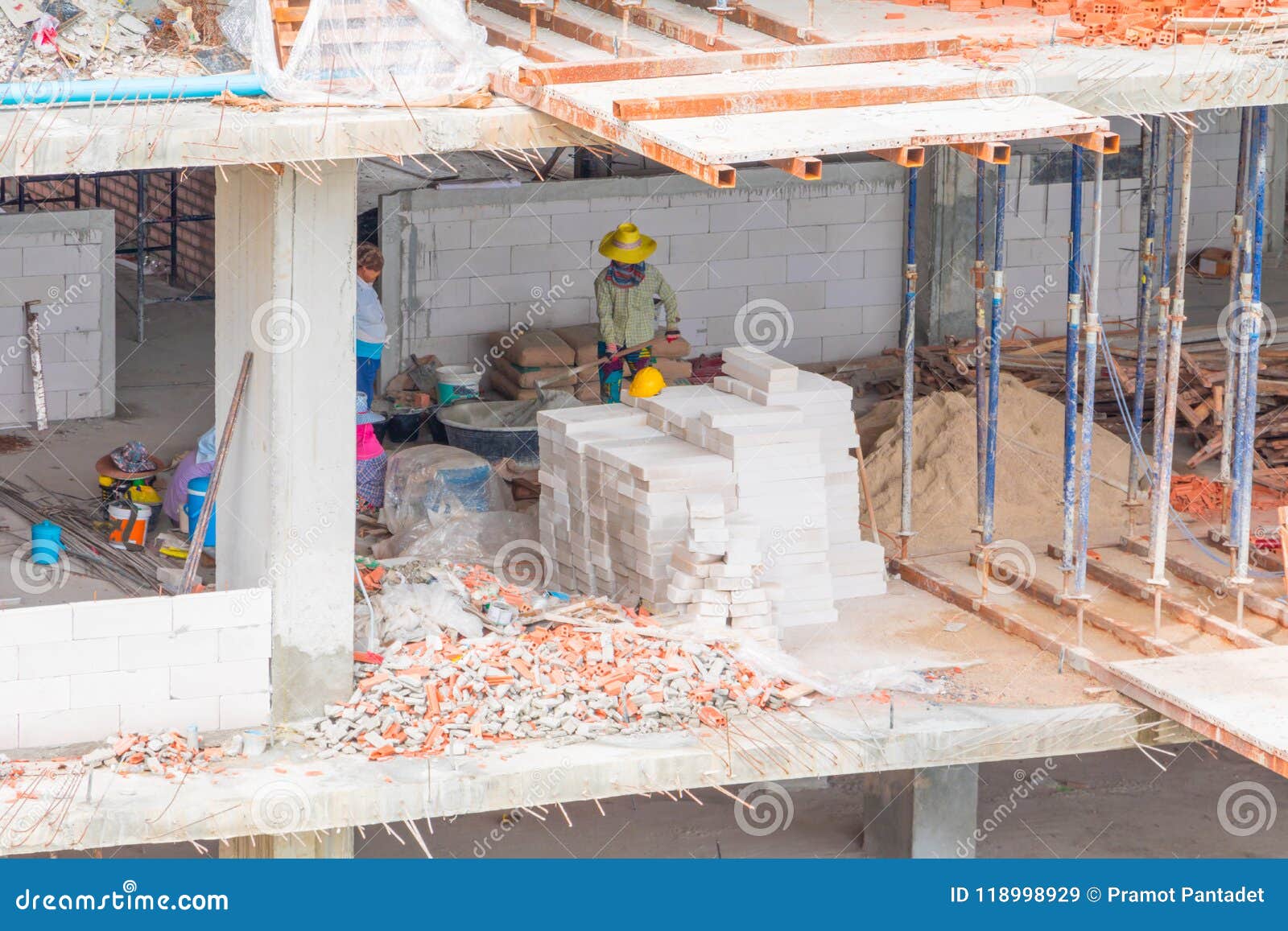 Construction Workers Site and Building of Housing at Laborer Work ...
