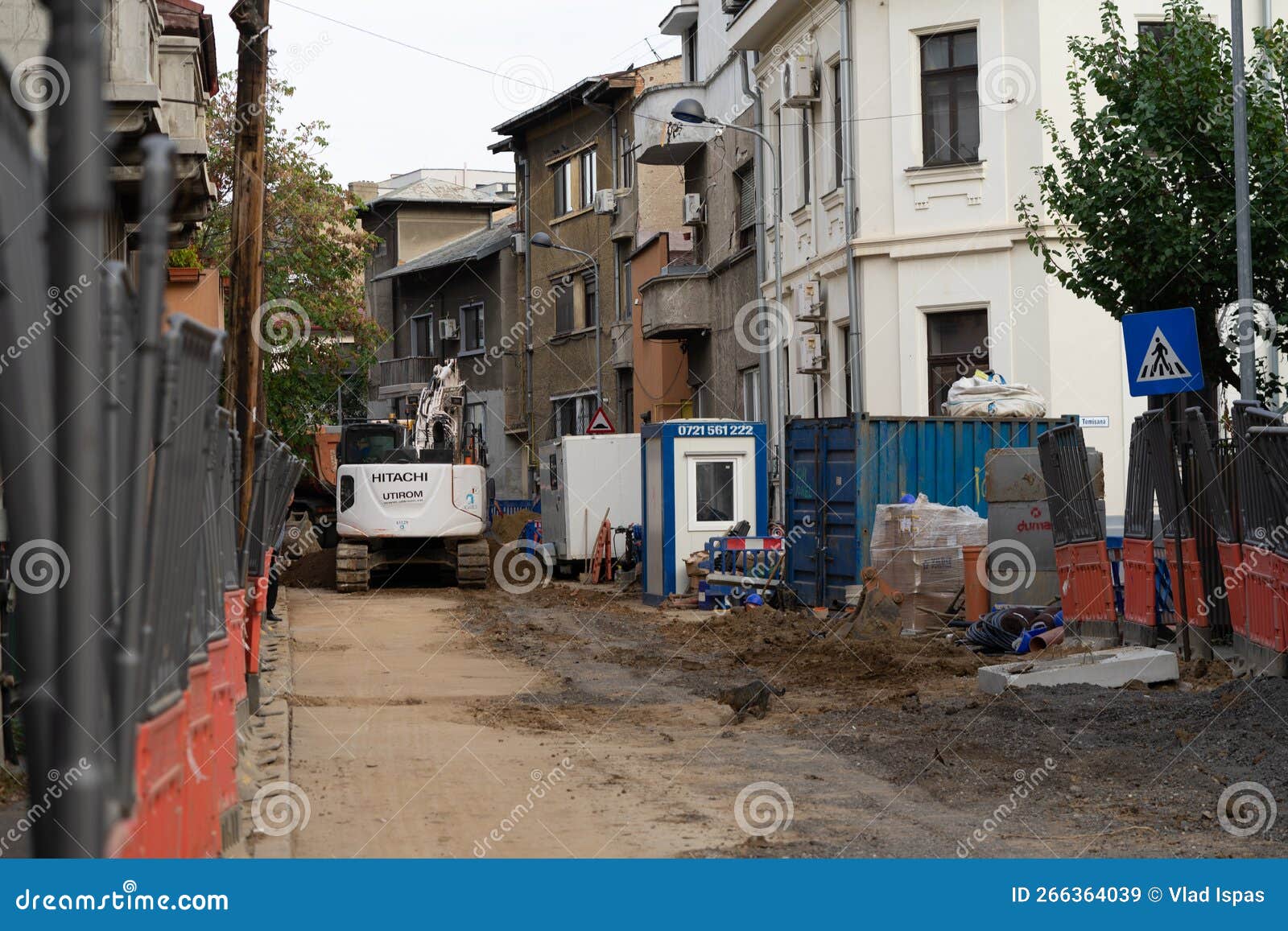 Construction Workers at Construction Site and Heavy Duty Bulldozer in ...