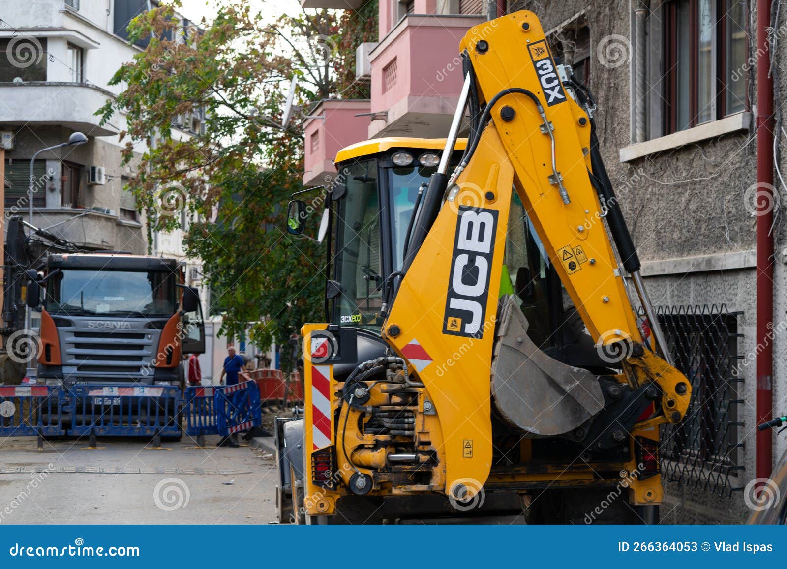Construction Workers at Construction Site and Heavy Duty Bulldozer in ...