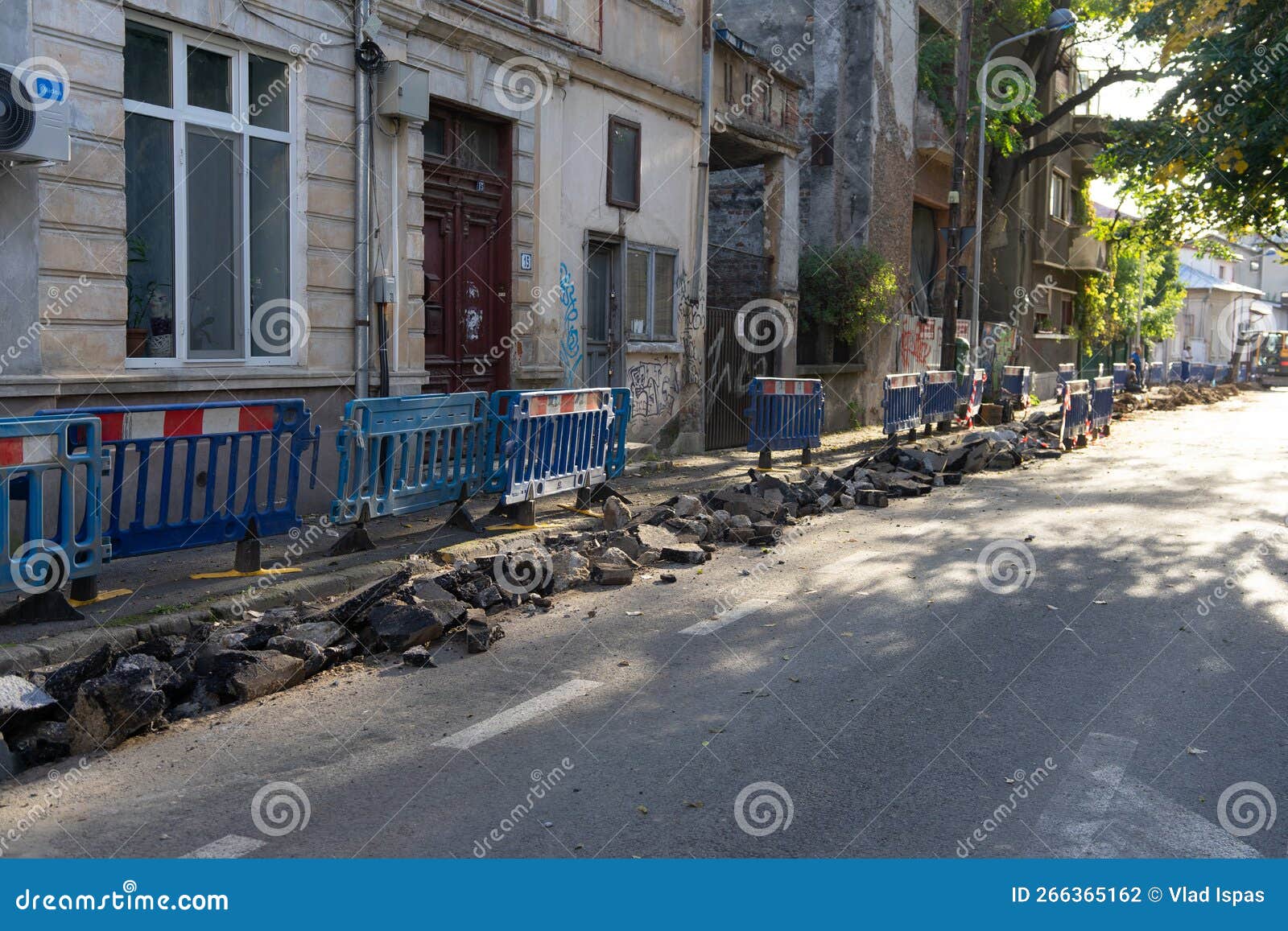 Construction Workers at Construction Site and Heavy Duty Bulldozer in ...
