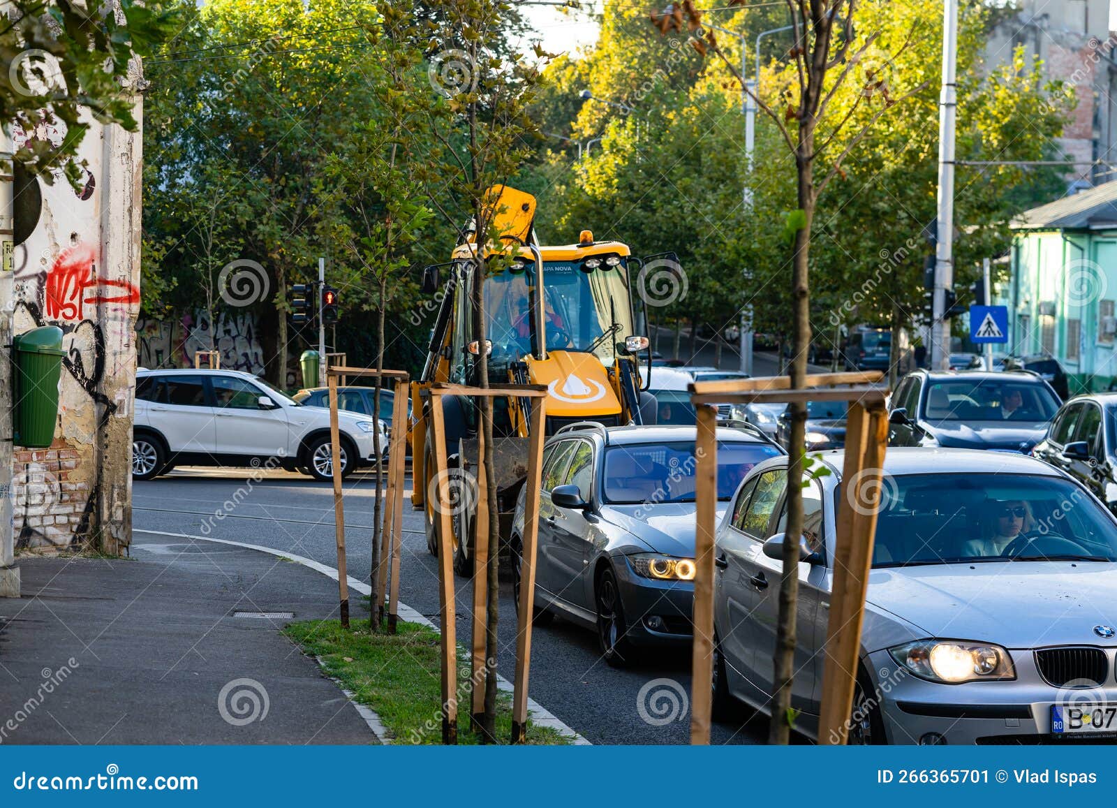 Construction Workers at Construction Site and Heavy Duty Bulldozer in ...