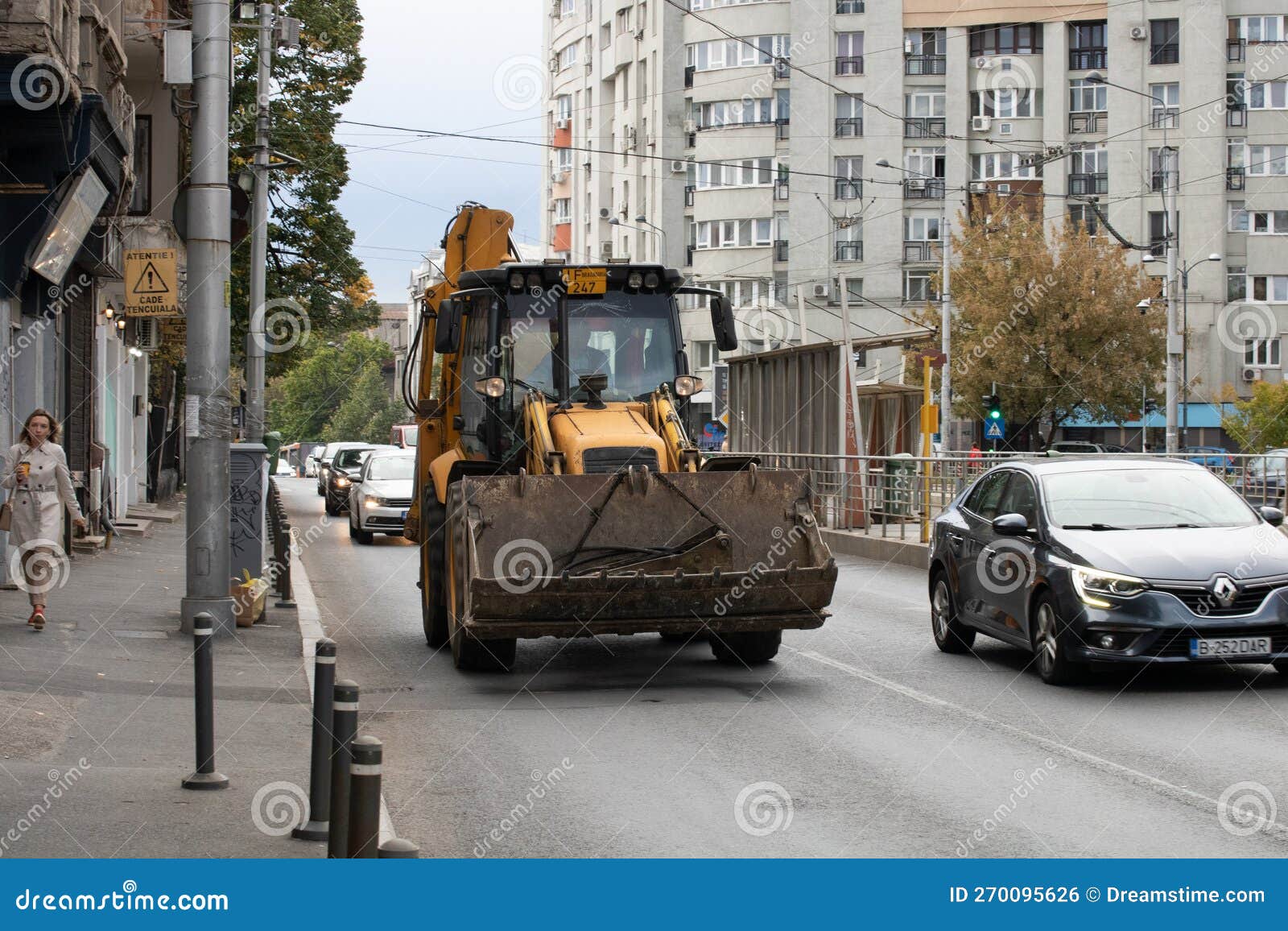 Construction Workers at Construction Site and Heavy Duty Bulldozer in ...