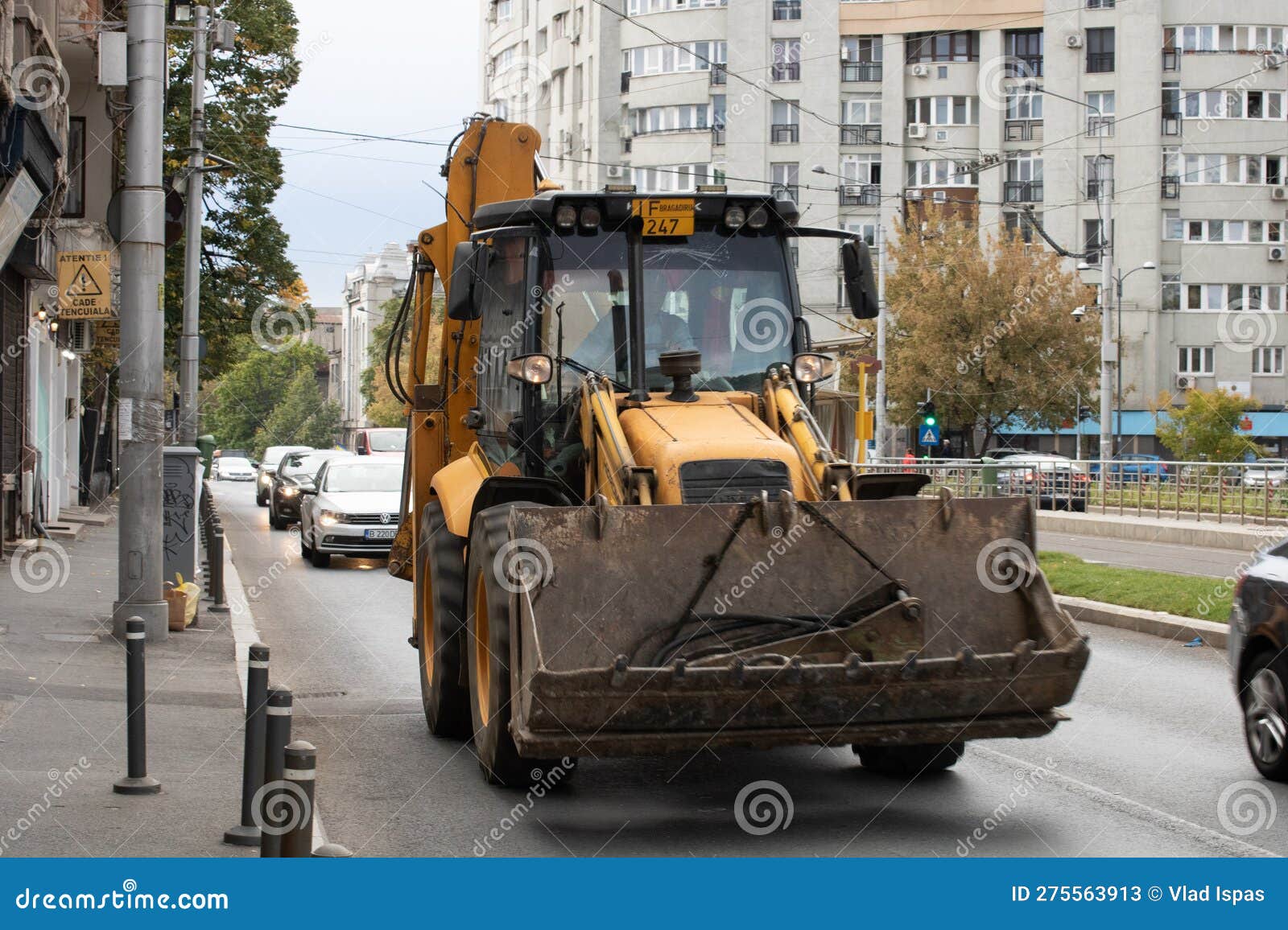 Construction Workers at Construction Site and Heavy Duty Bulldozer in ...