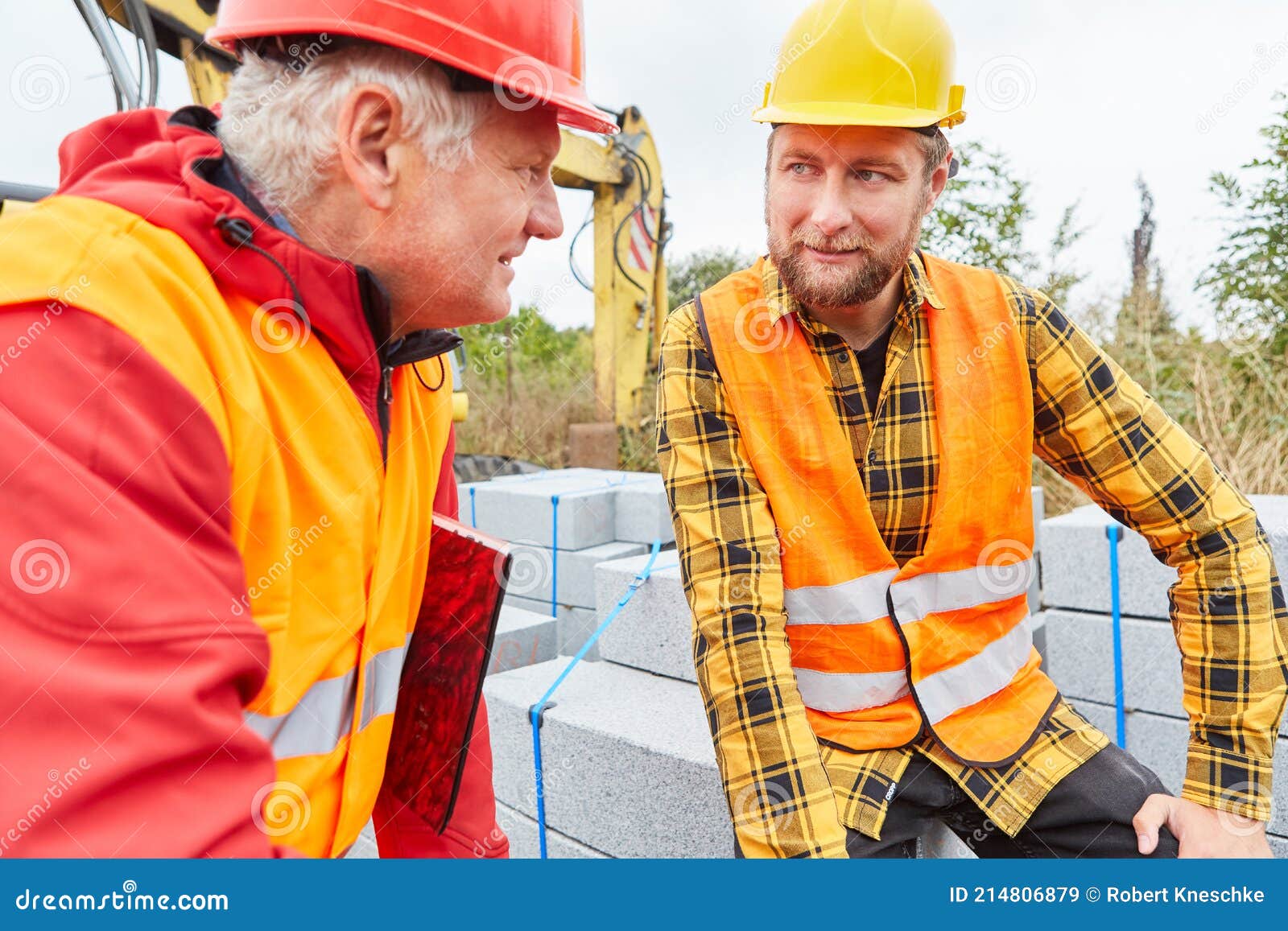 Construction Workers and Site Managers on the Construction Site of ...