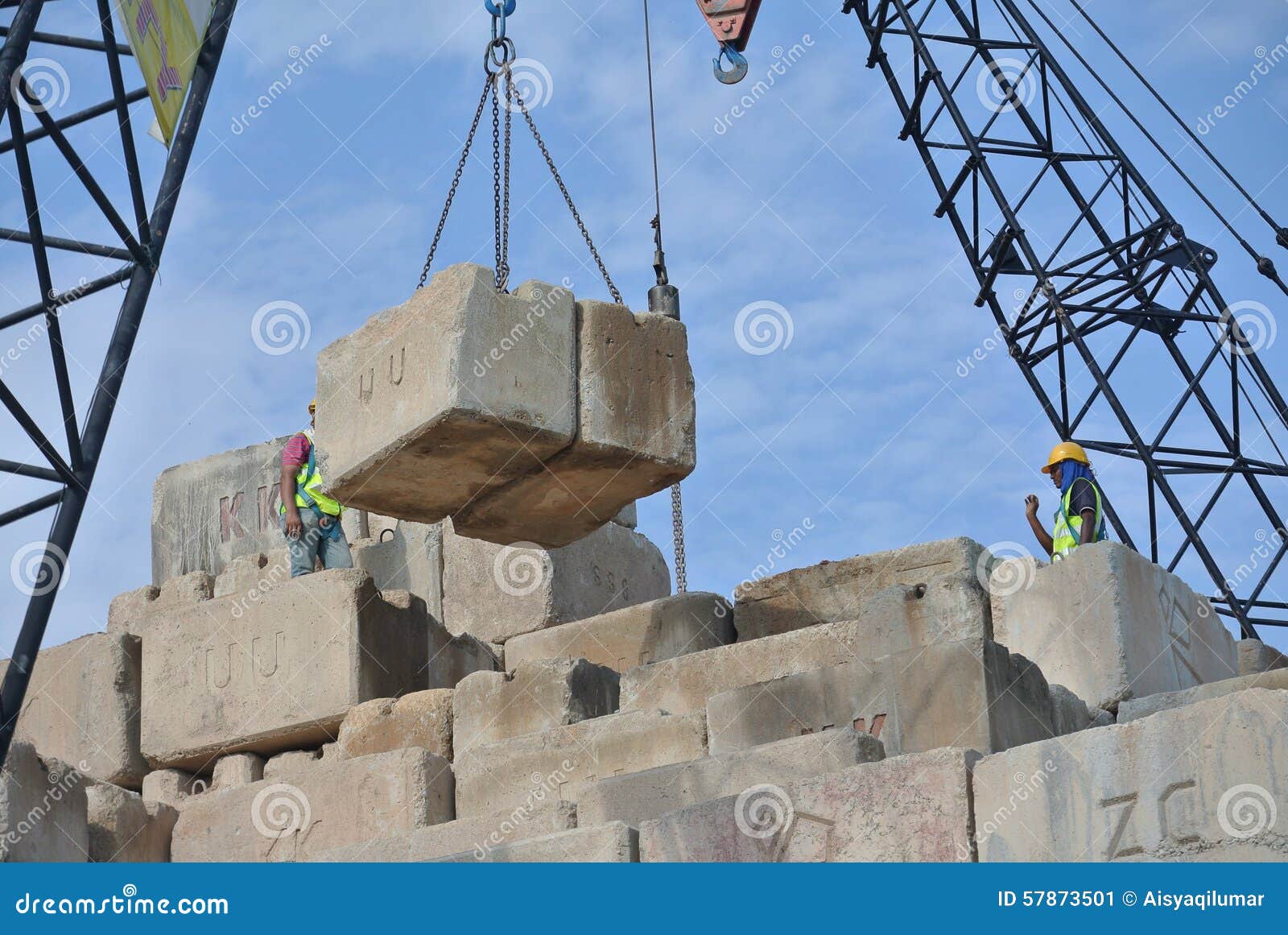 Construction Workers Stacking the Maintain Load Test Block at the ...