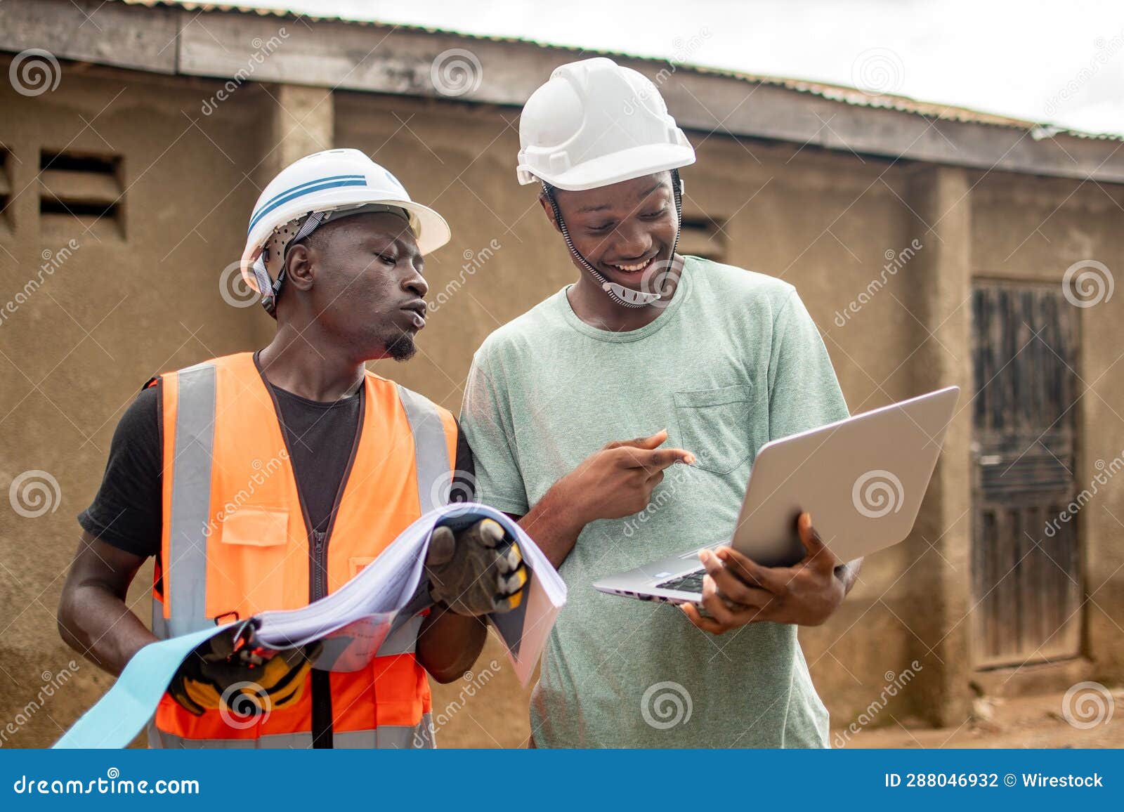 Construction Workers Standing Side by Side Outdoors in a Collaborative ...