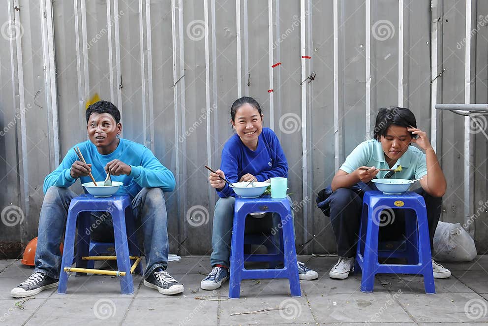 Construction Workers at a Street Restaurant Editorial Stock Image ...
