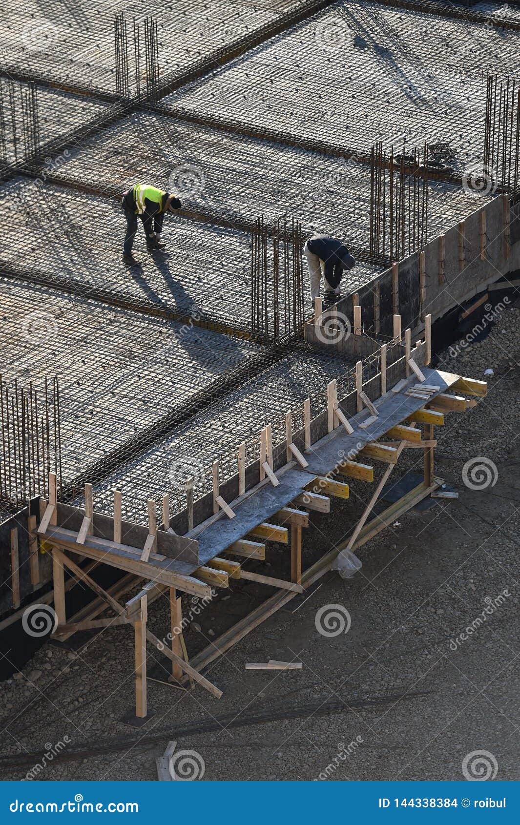Construction Team Working on a Construction Site Stock Photo - Image of ...