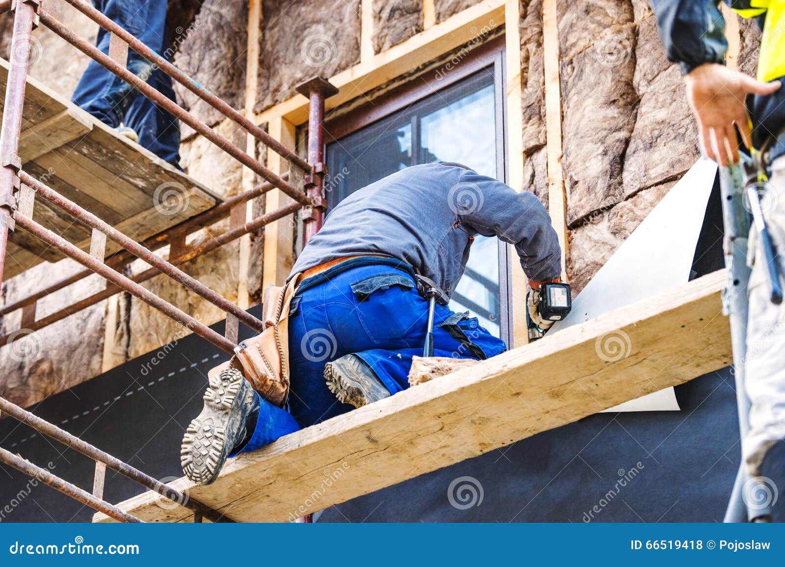 Construction Workers Thermally Insulating House Facade with Glass Wool ...