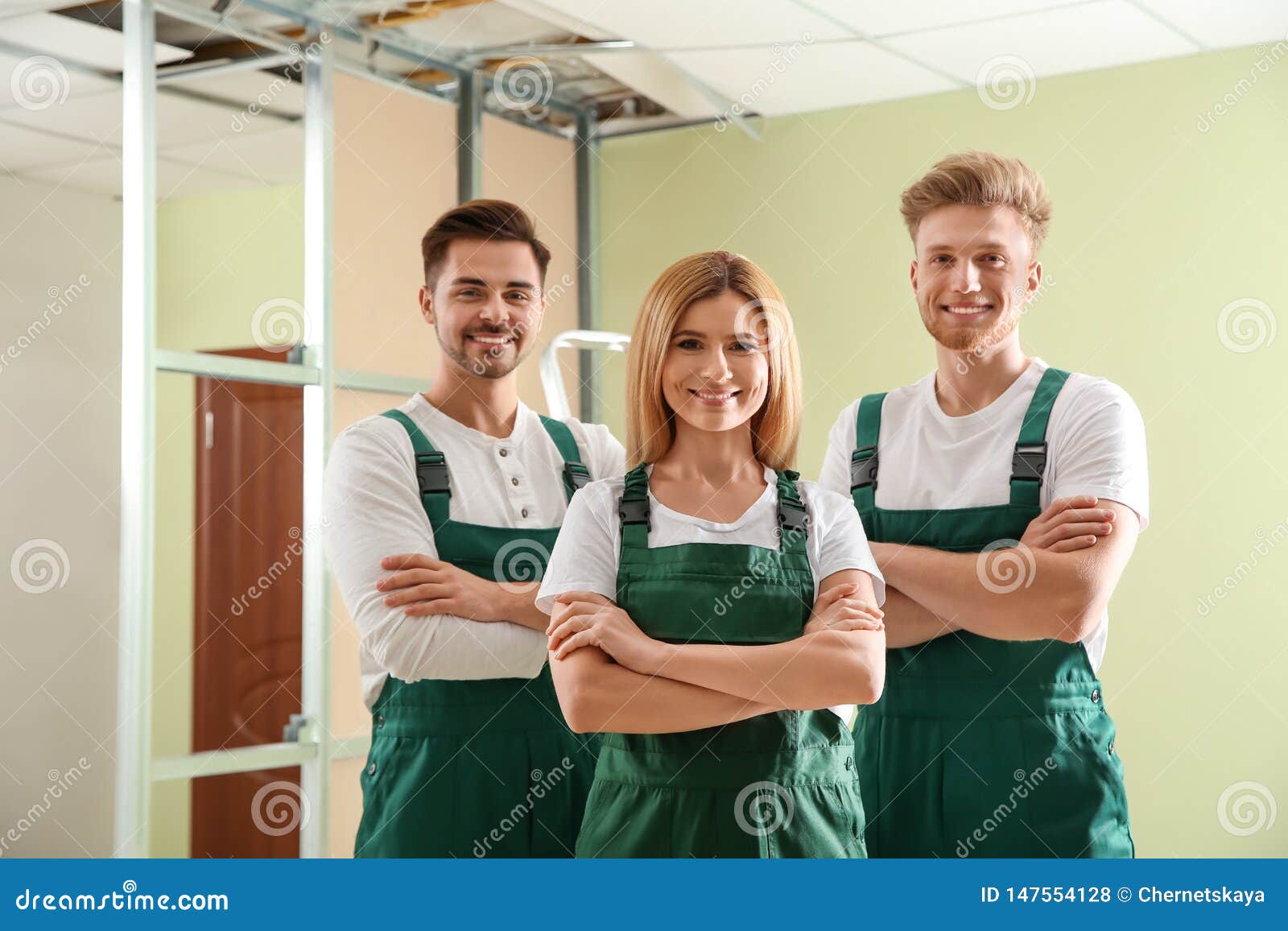 Two Workers In Uniforms At Production Line In Plant Royalty-Free Stock ...
