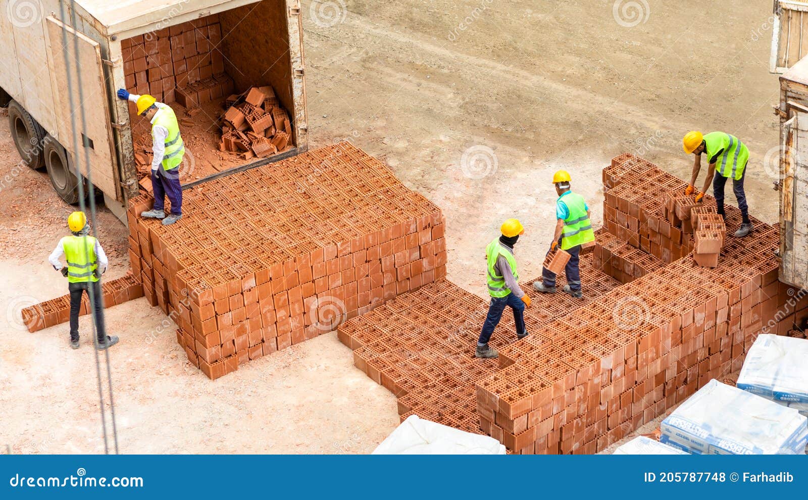Construction Workers Unloading Bricks Editorial Stock Photo - Image of ...