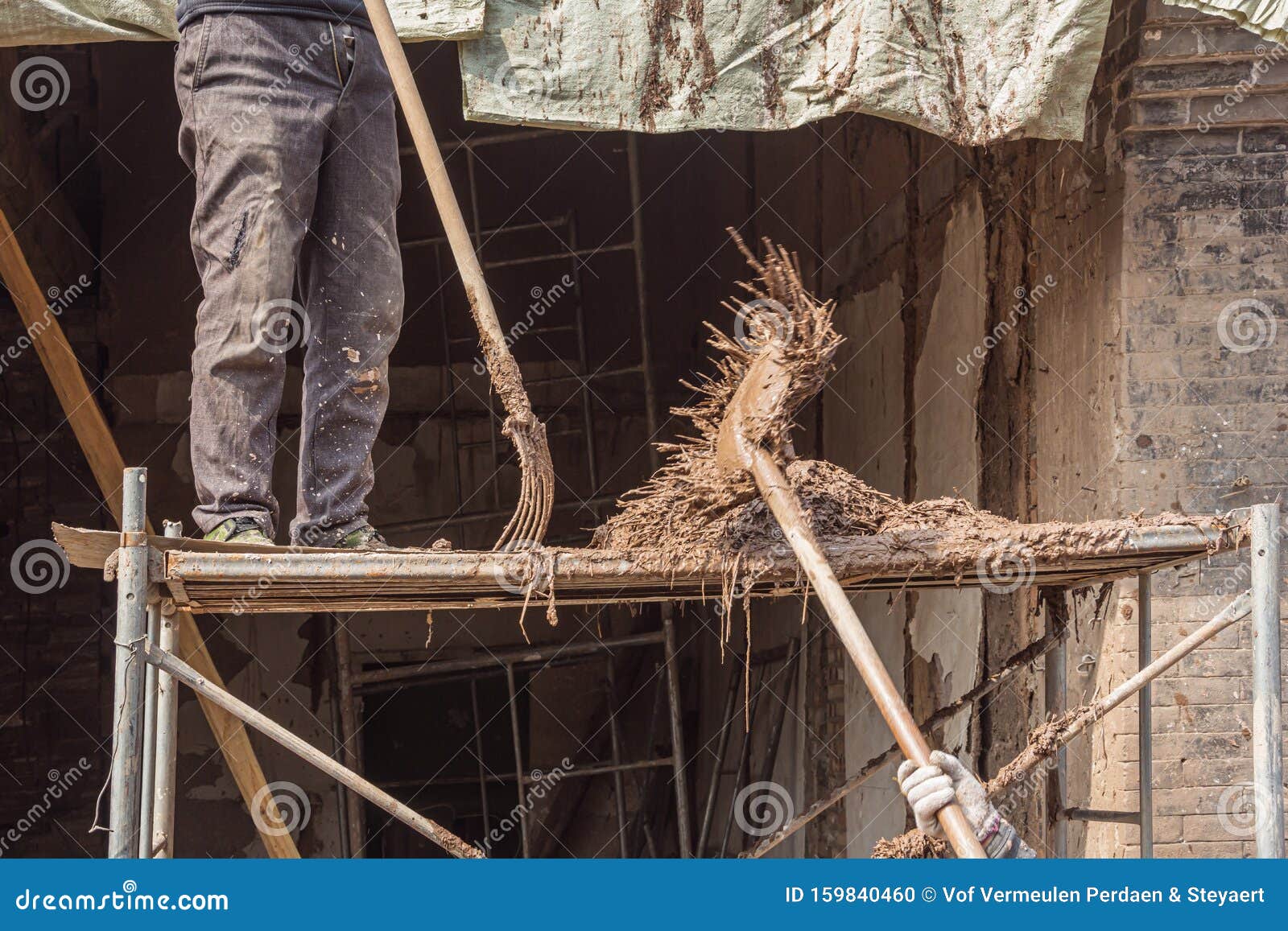 Construction Workers Using Traditional Building Materials Stock Photo ...