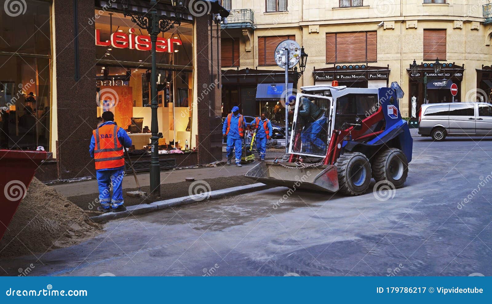 Construction Workers and Vehicles in the Center of Prague Repair Roads ...
