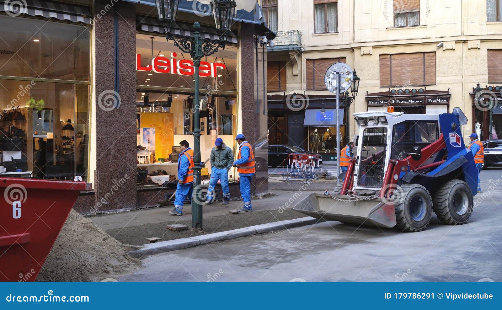Construction Workers and Vehicles in the Center of Prague Repair Roads ...