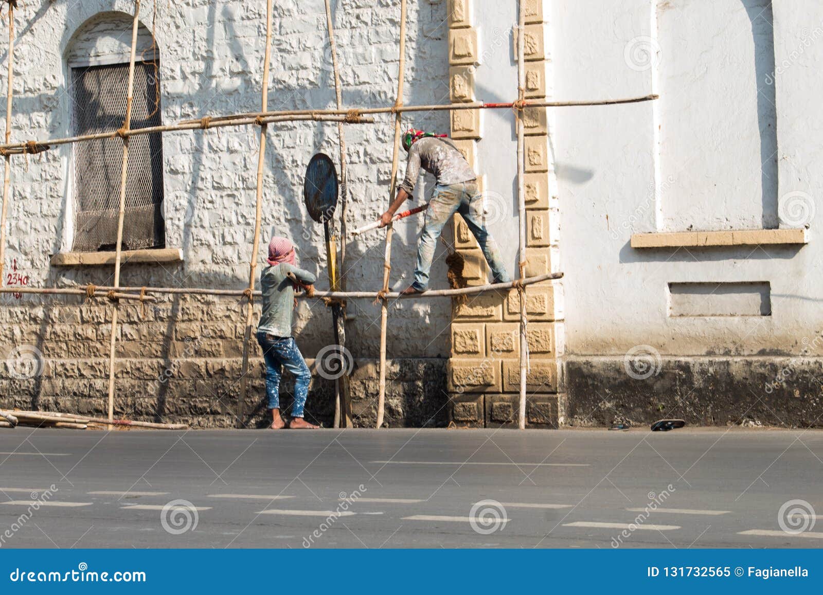 Construction Workers with Very Poor Security Working on a Building in ...