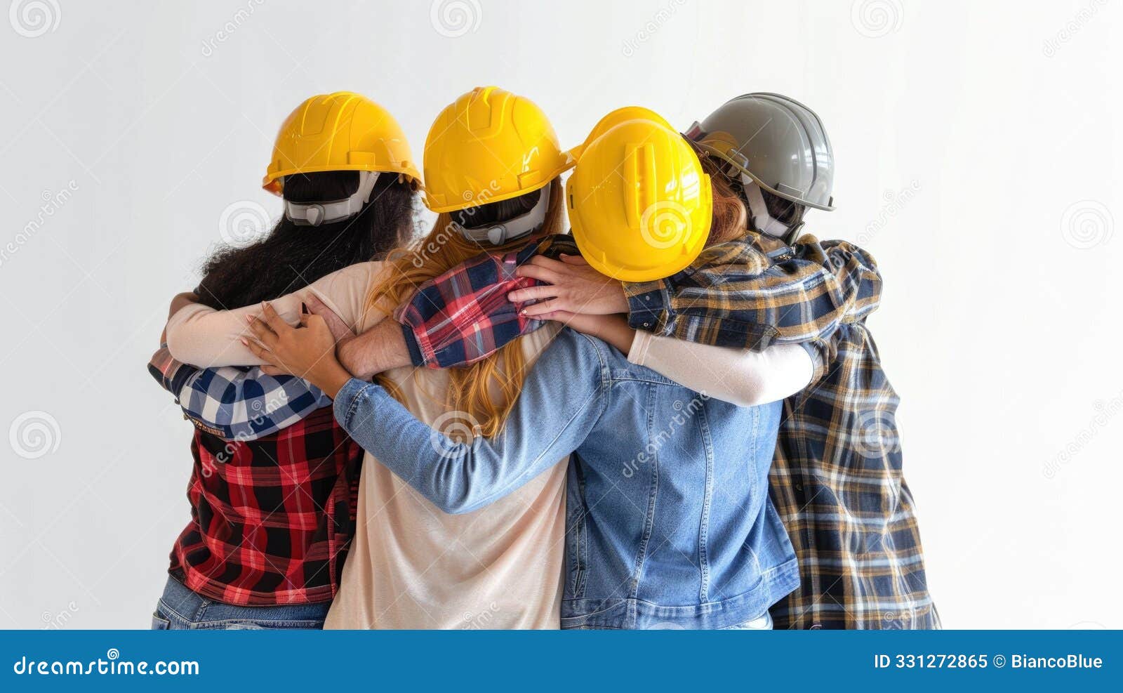 Construction Workers Wearing Hard Hats and Safety Gear at a ...