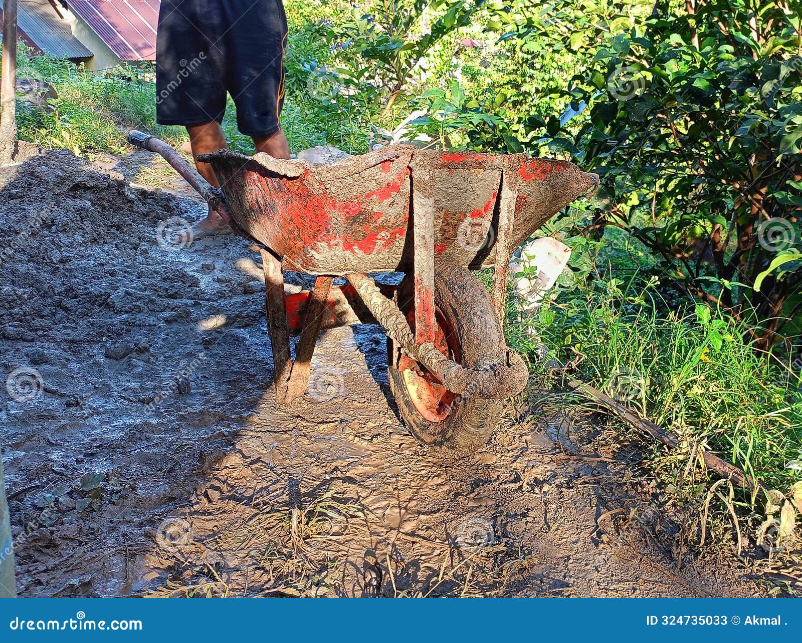 Construction Worker Mixing Cement, a Mixture of Cement and Sand Stock ...