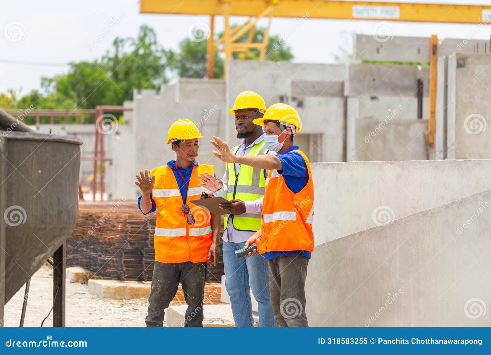 Construction Workers at Work, Foreman and Worker Team Discussing at ...