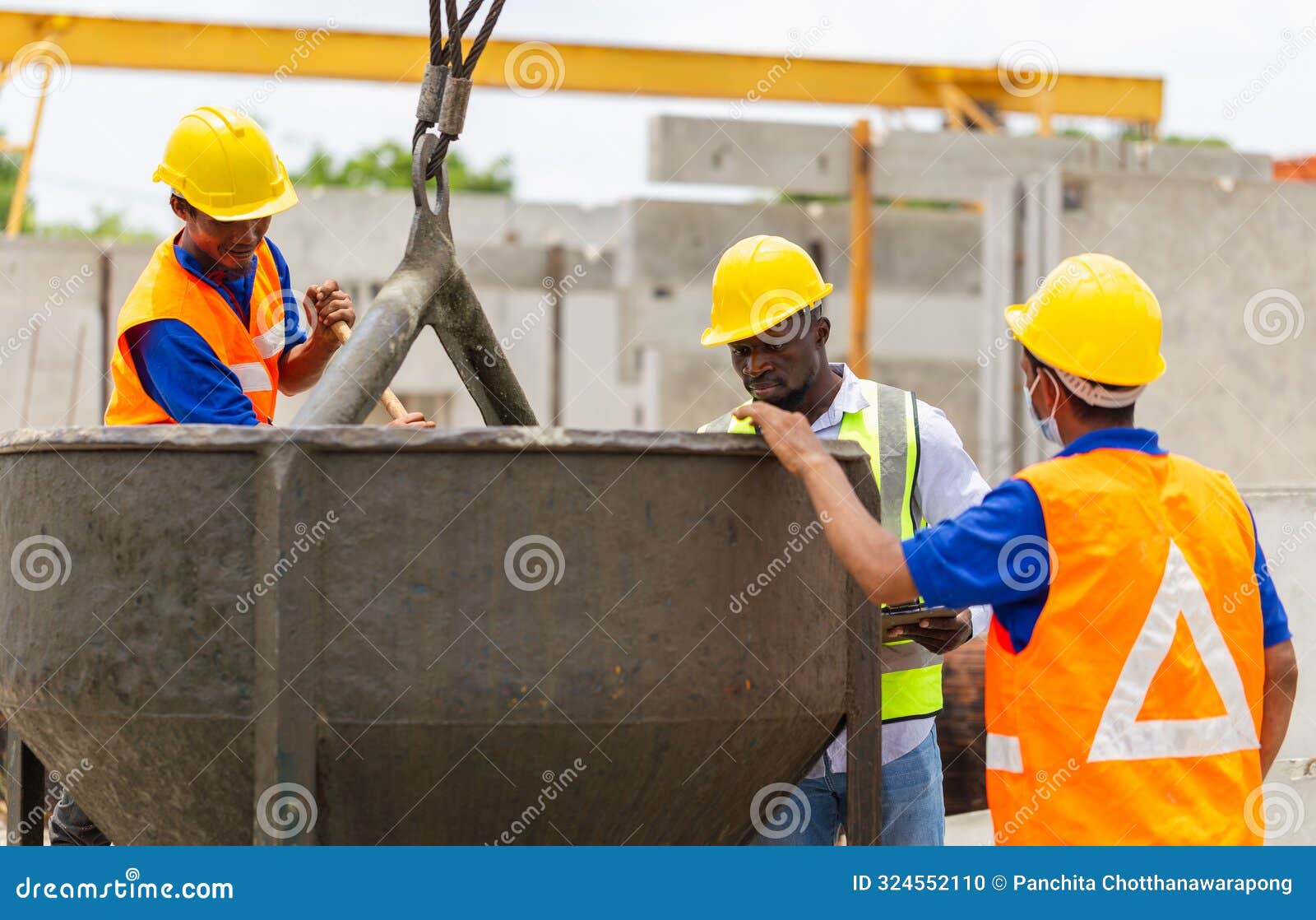 Construction Workers at Work, Foreman and Worker Team Discussing at ...