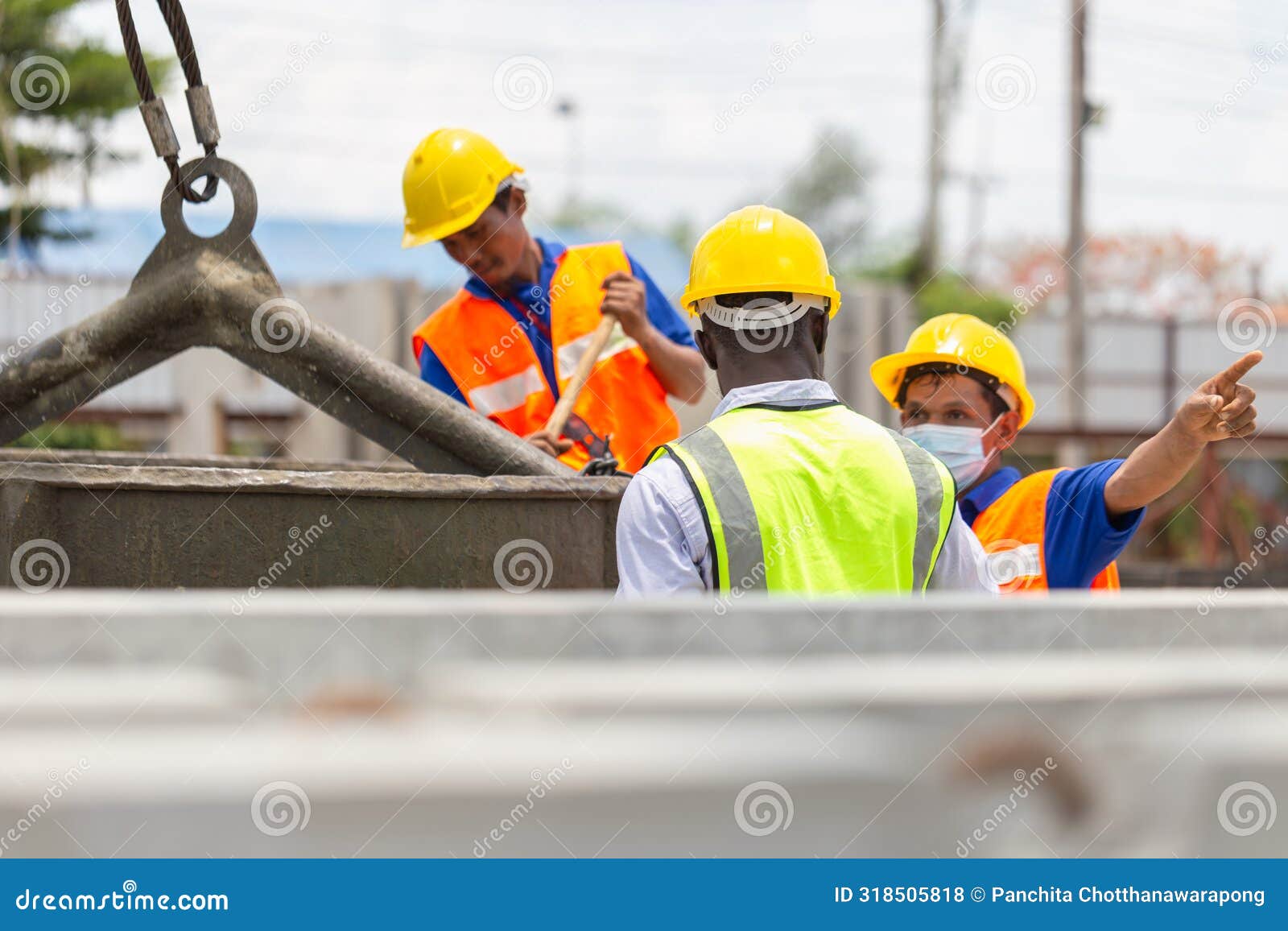 Construction Workers at Work, Foreman and Worker Team Discussing at ...