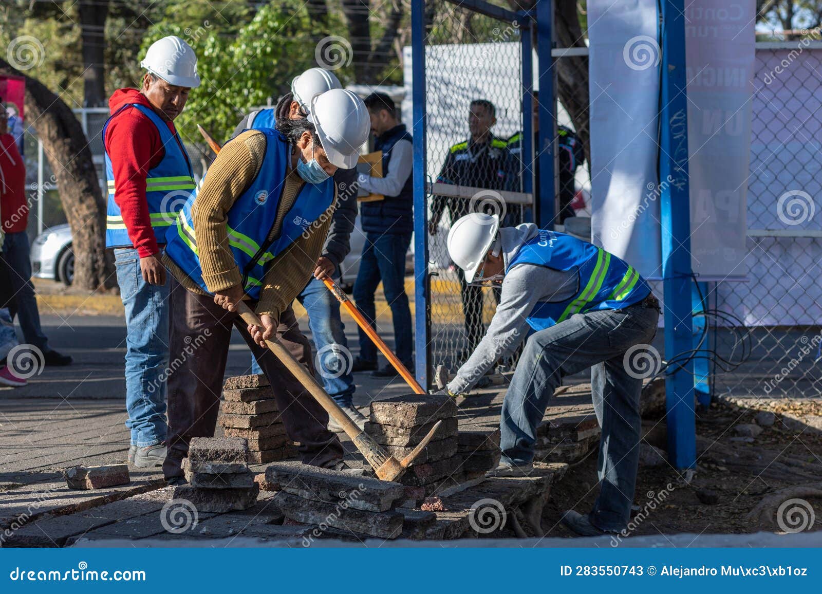 Construction Workers Remove Cement from a Recreational Park that Will ...