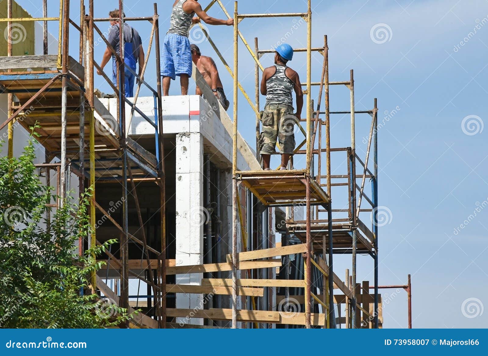 Construction Workers at Work Editorial Photography - Image of class, adult: 73958007