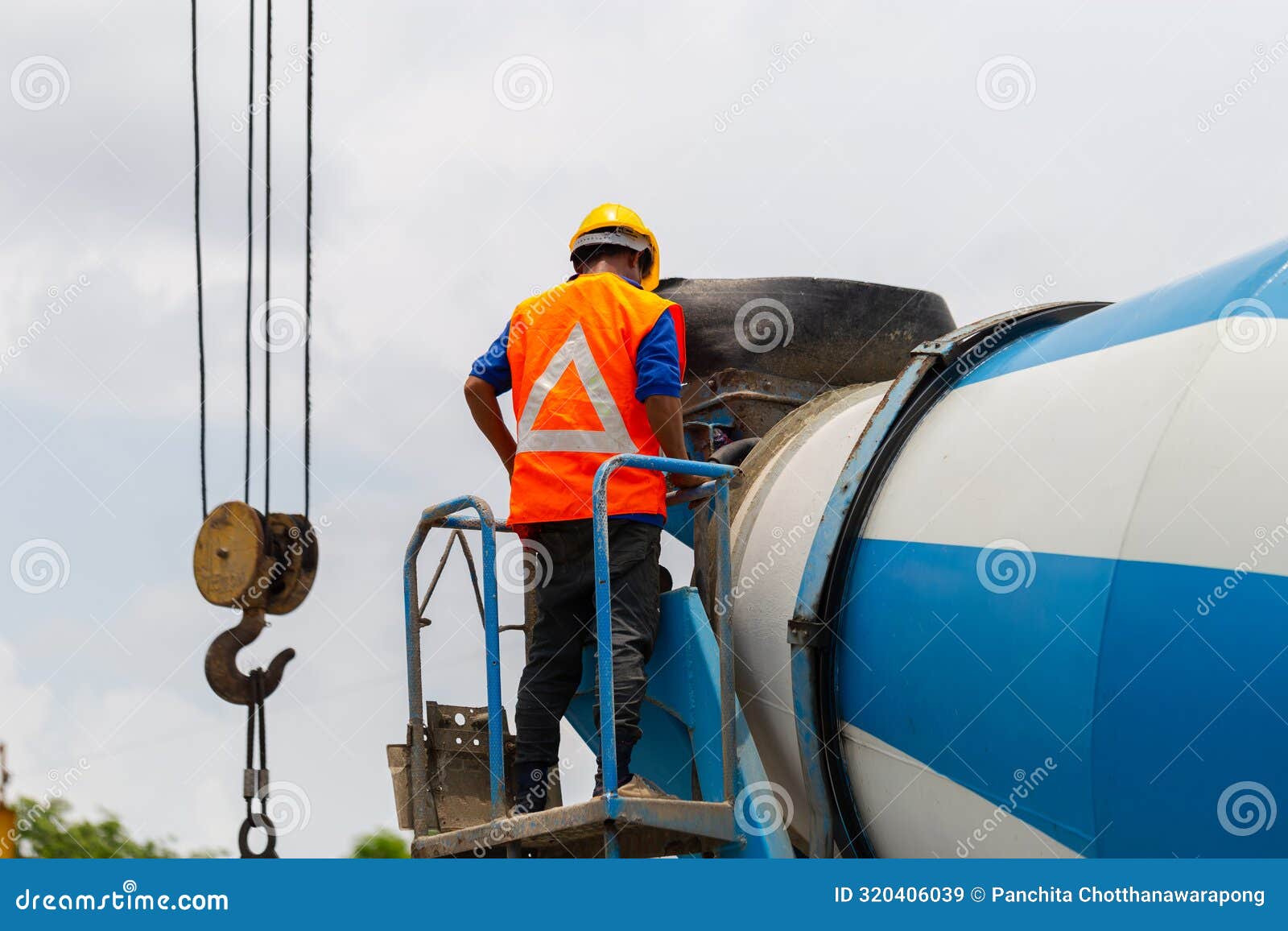 Construction Workers at Work, Worker Man on Concrete Mixer Trucks at ...