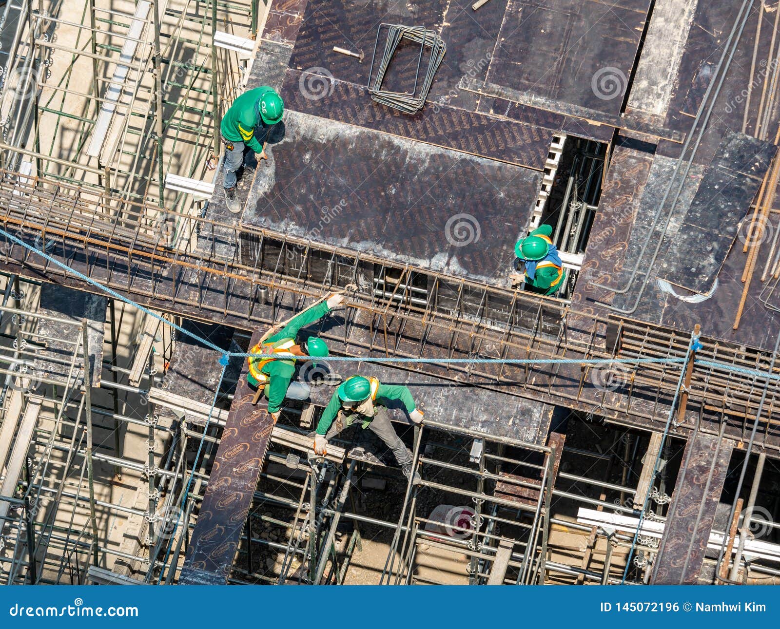 Construction Workers Working in the Building Stock Photo - Image of ...