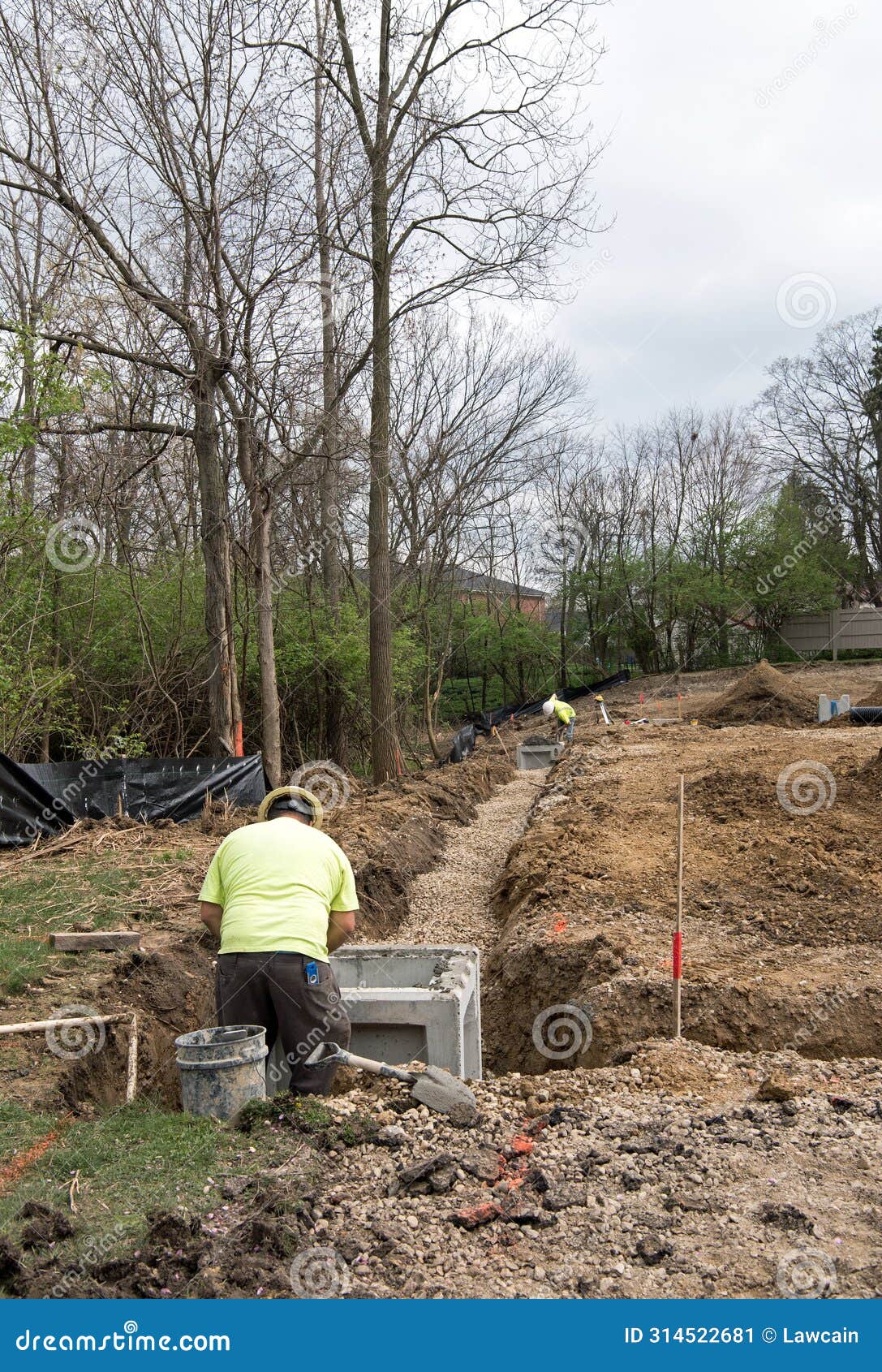 Workers Cementing Corner Catch Basins in Place, Vertical Stock Image ...