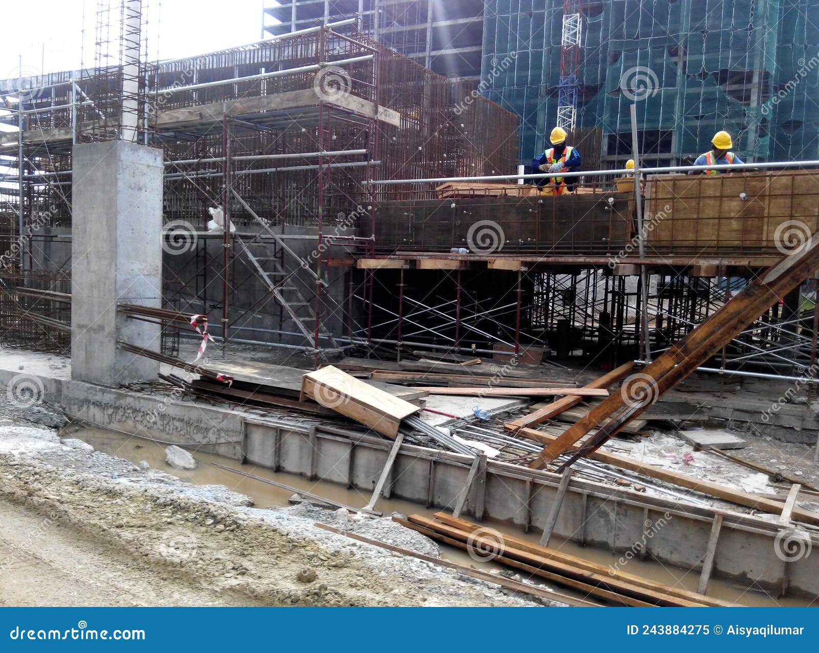 Construction Workers Working at Height at the Construction Site ...