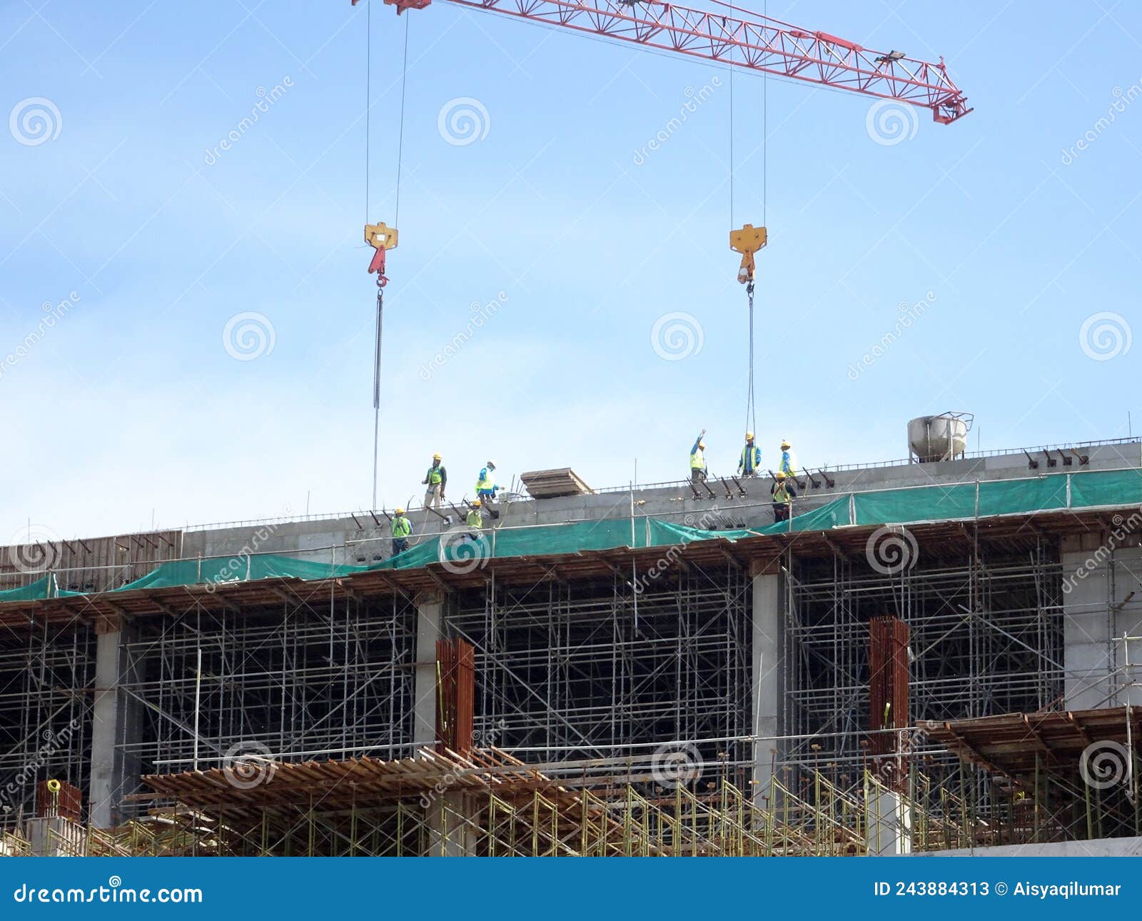 Construction Workers Working at Height at the Construction Site ...