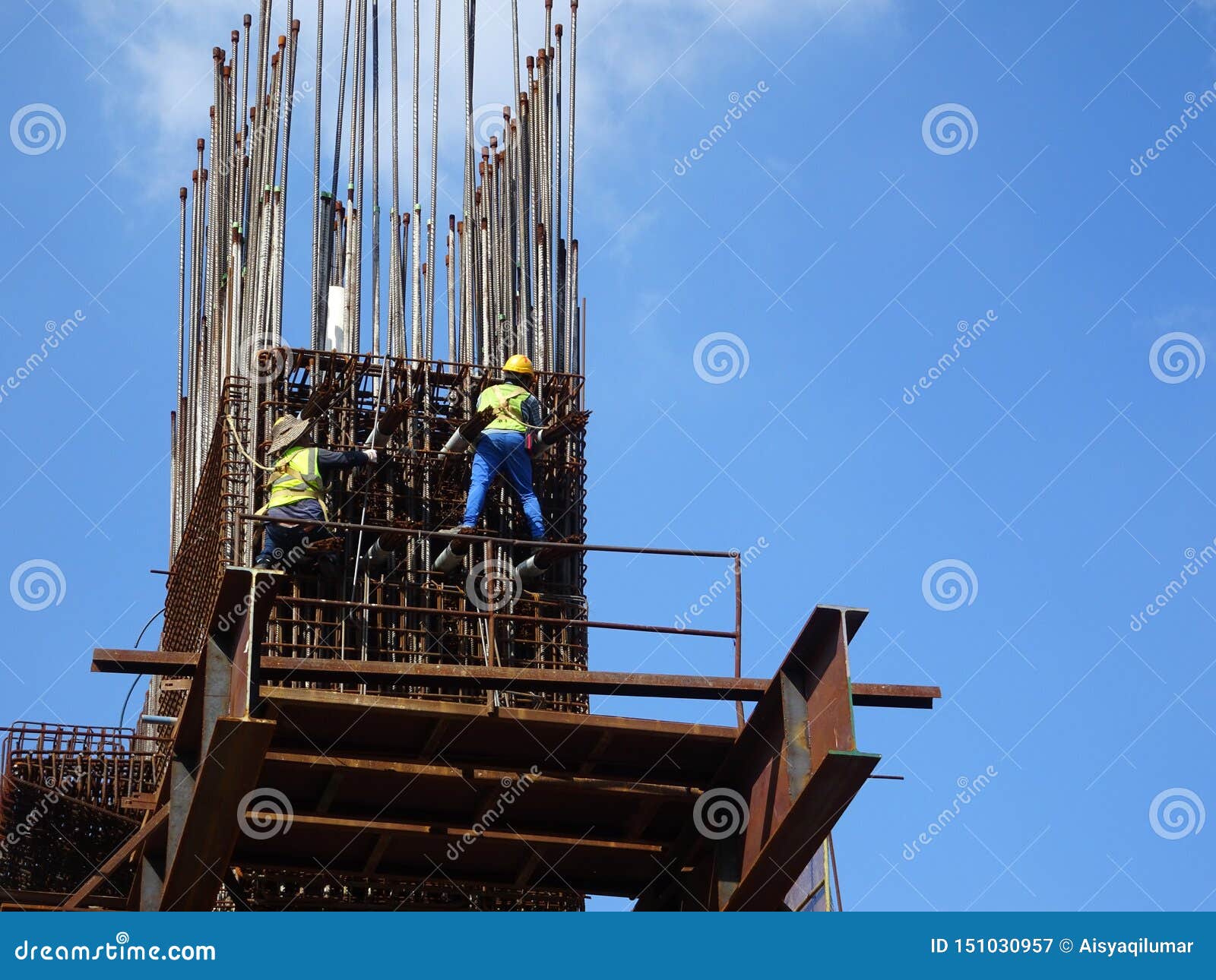 Construction Workers Working at Height at the Construction Site ...